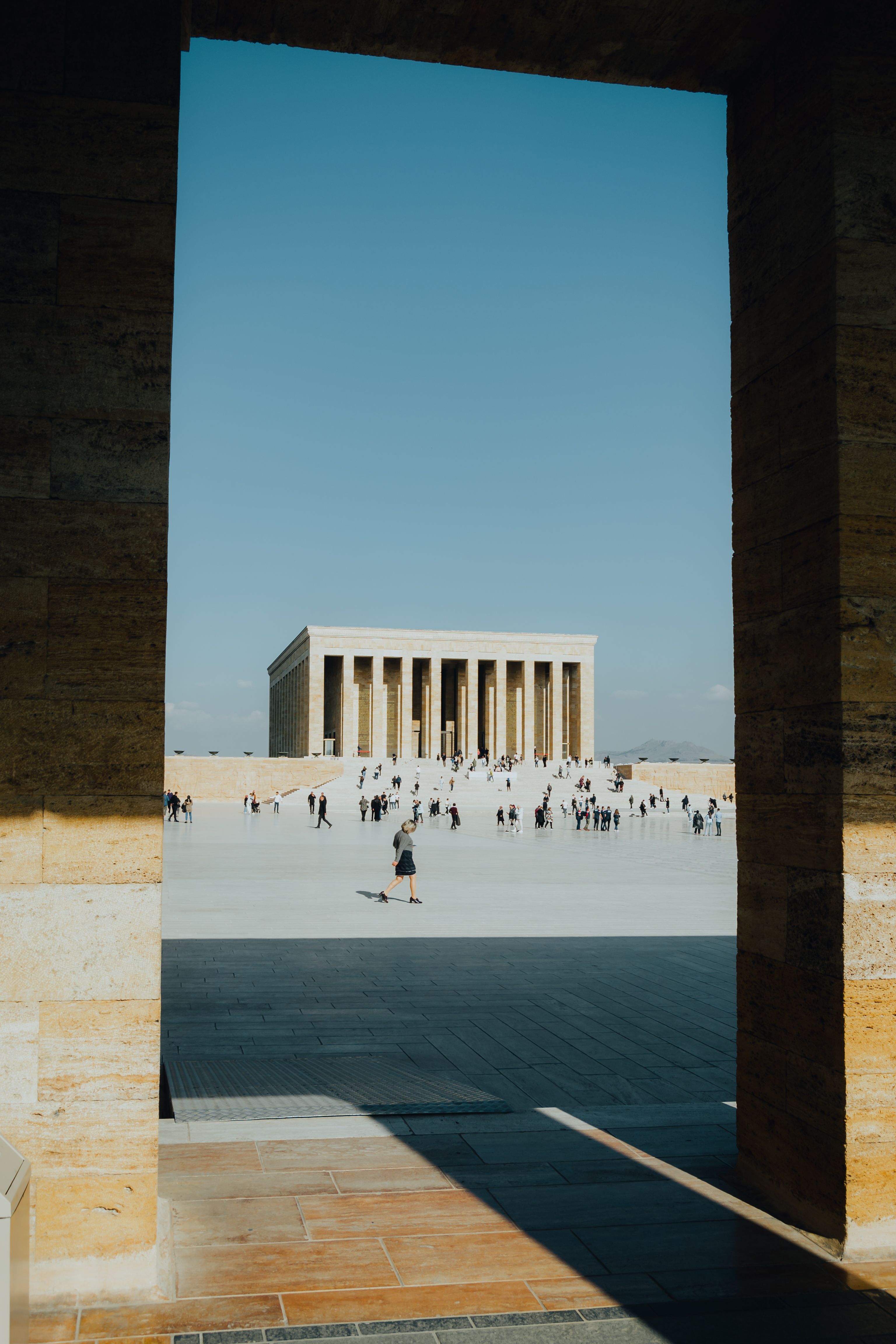 A view of a building with people walking around · Free Stock Photo