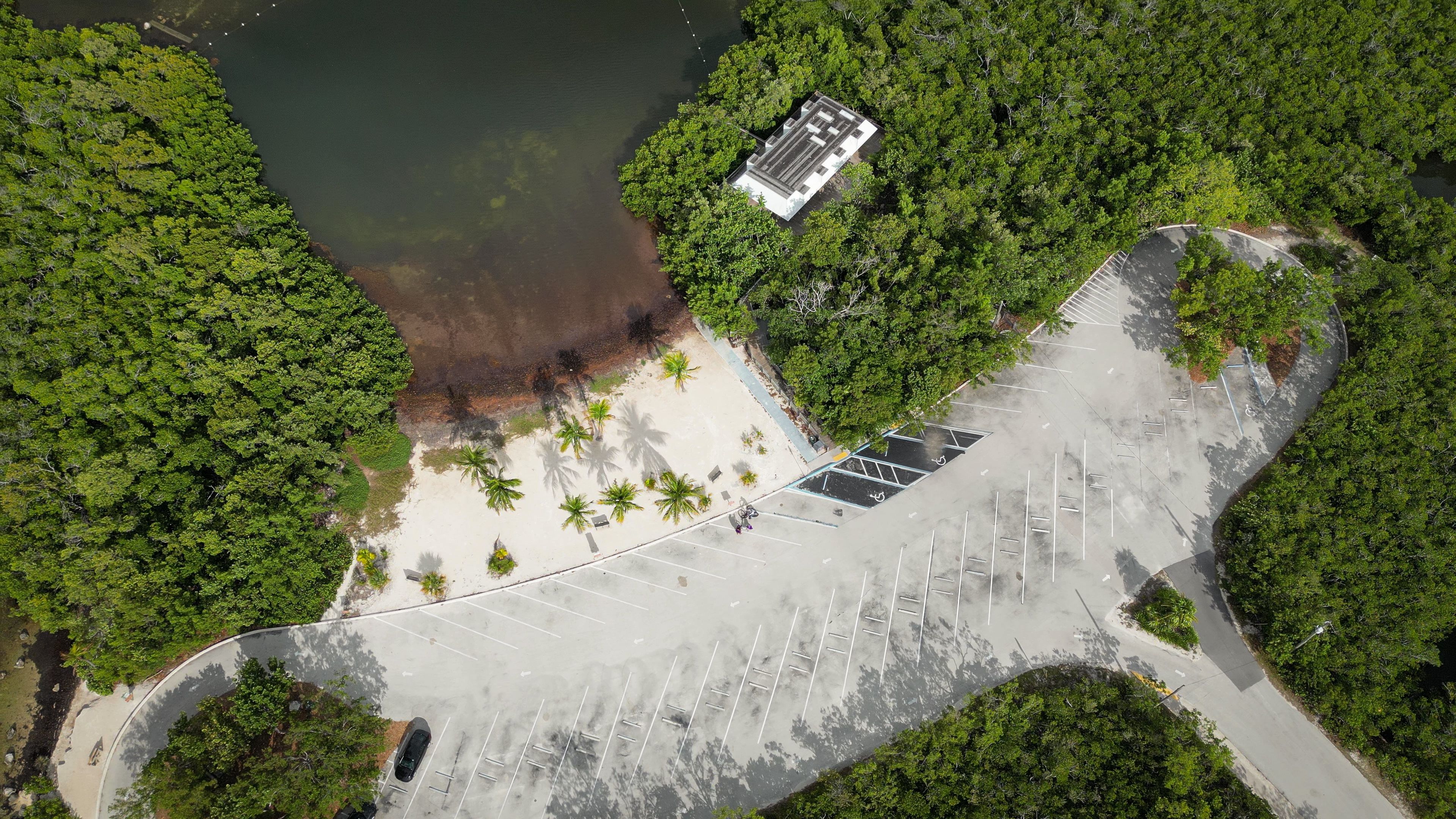An aerial view of a beach and a house · Free Stock Photo