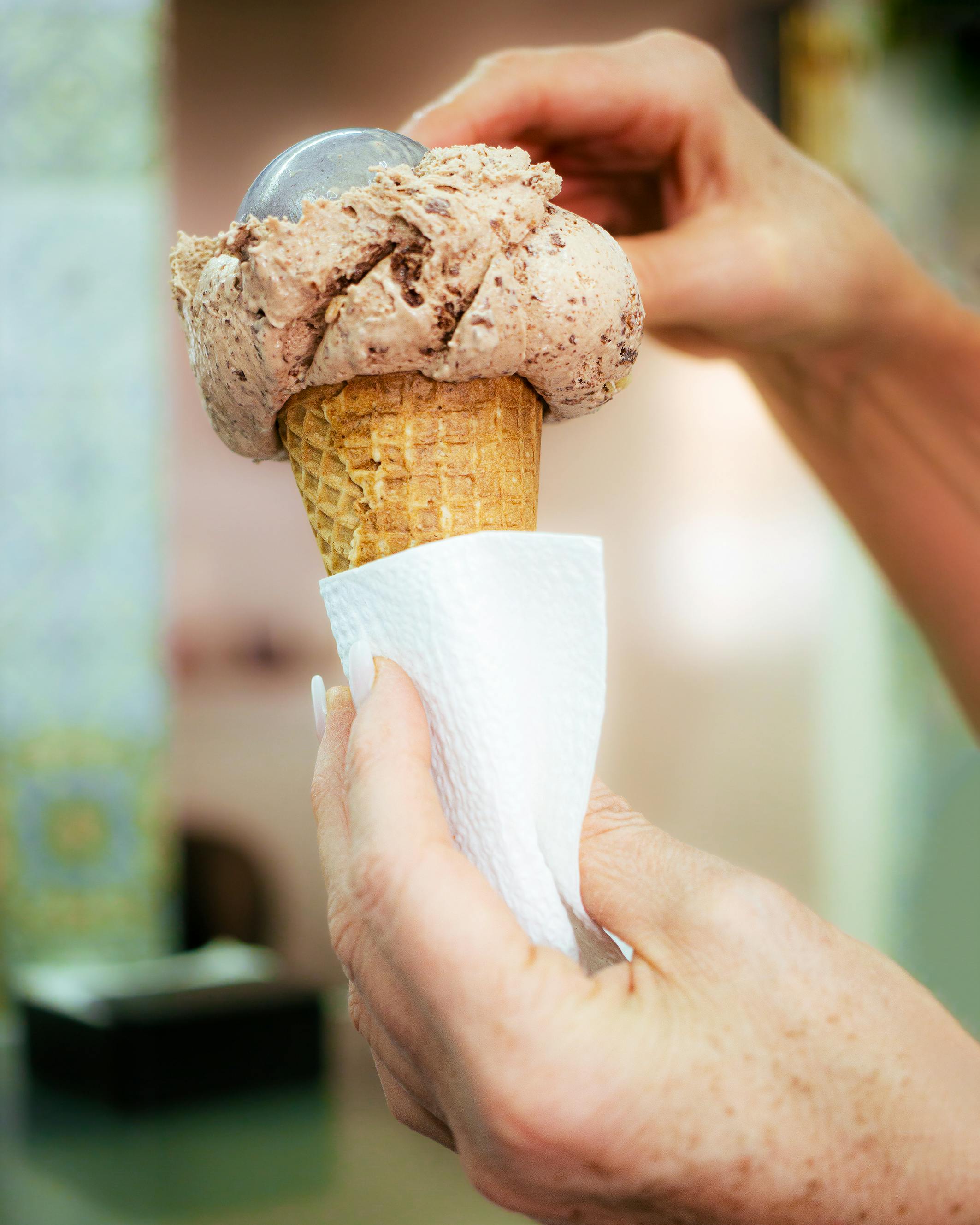 Person Holding Two Ice Creams · Free Stock Photo