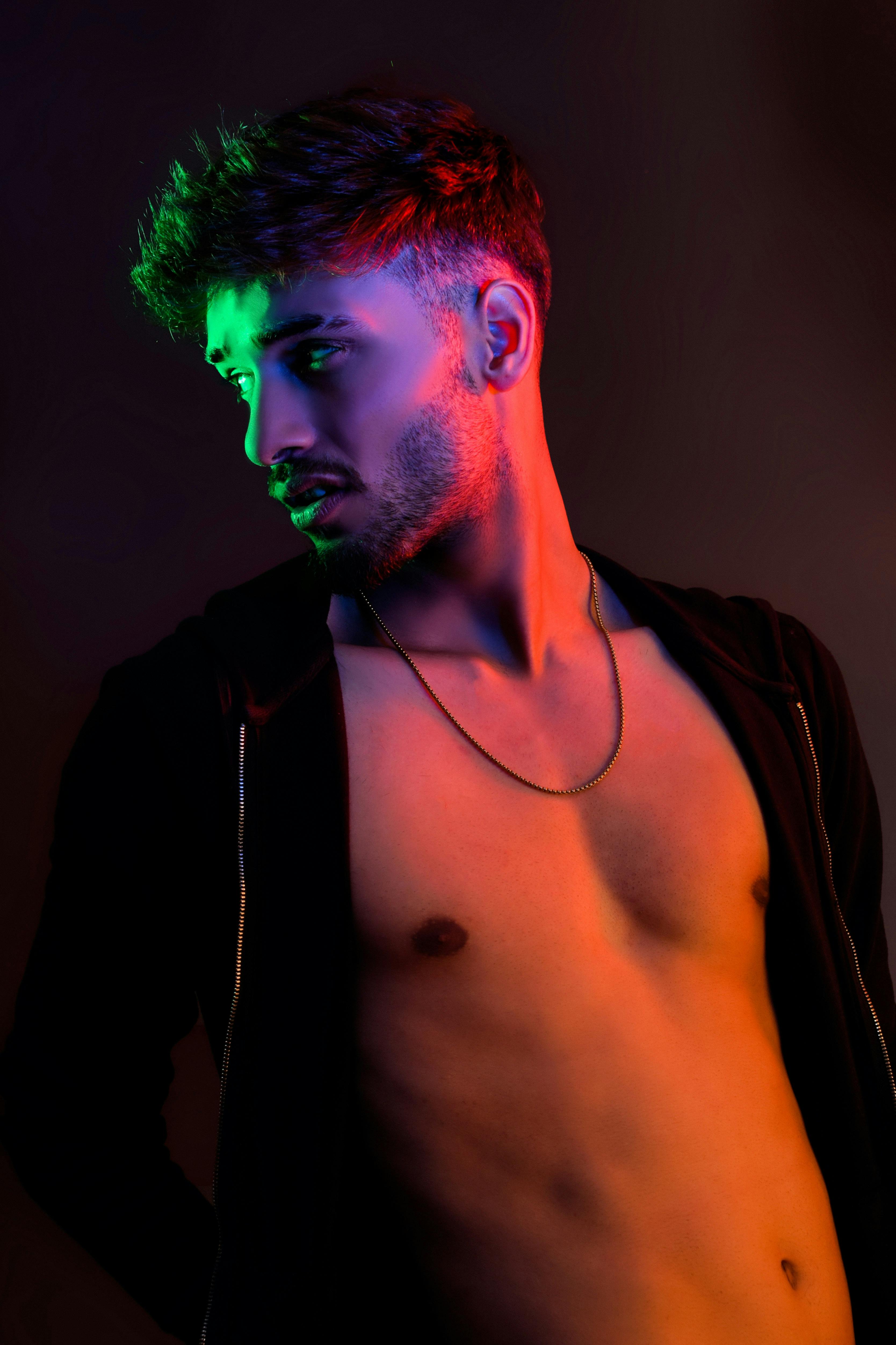 Portrait of Man in Unzipped Black Clothes · Free Stock Photo