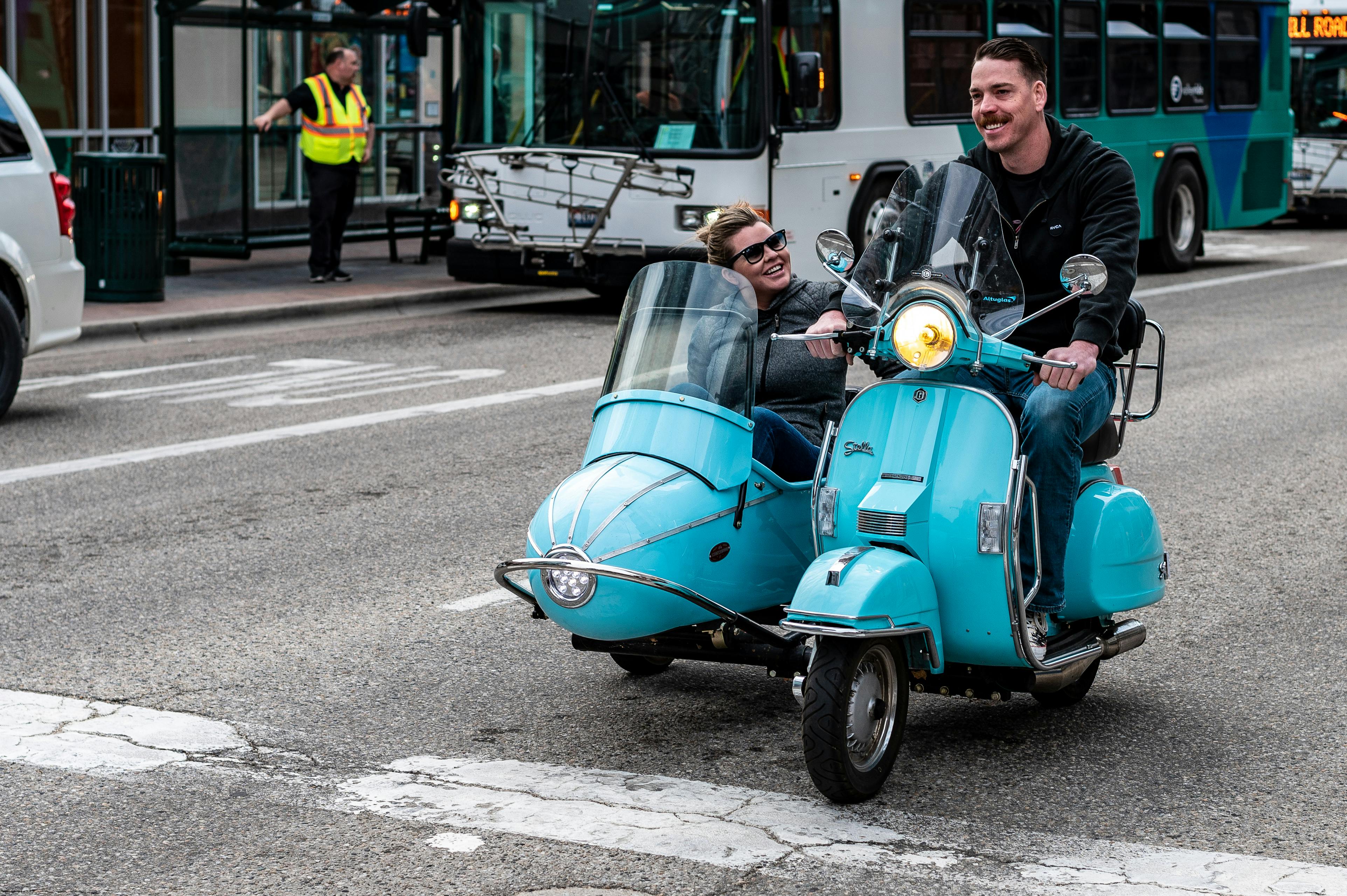 Man Driving Teal Motorcycle With Cab And Passenger On Road · Free Stock ...