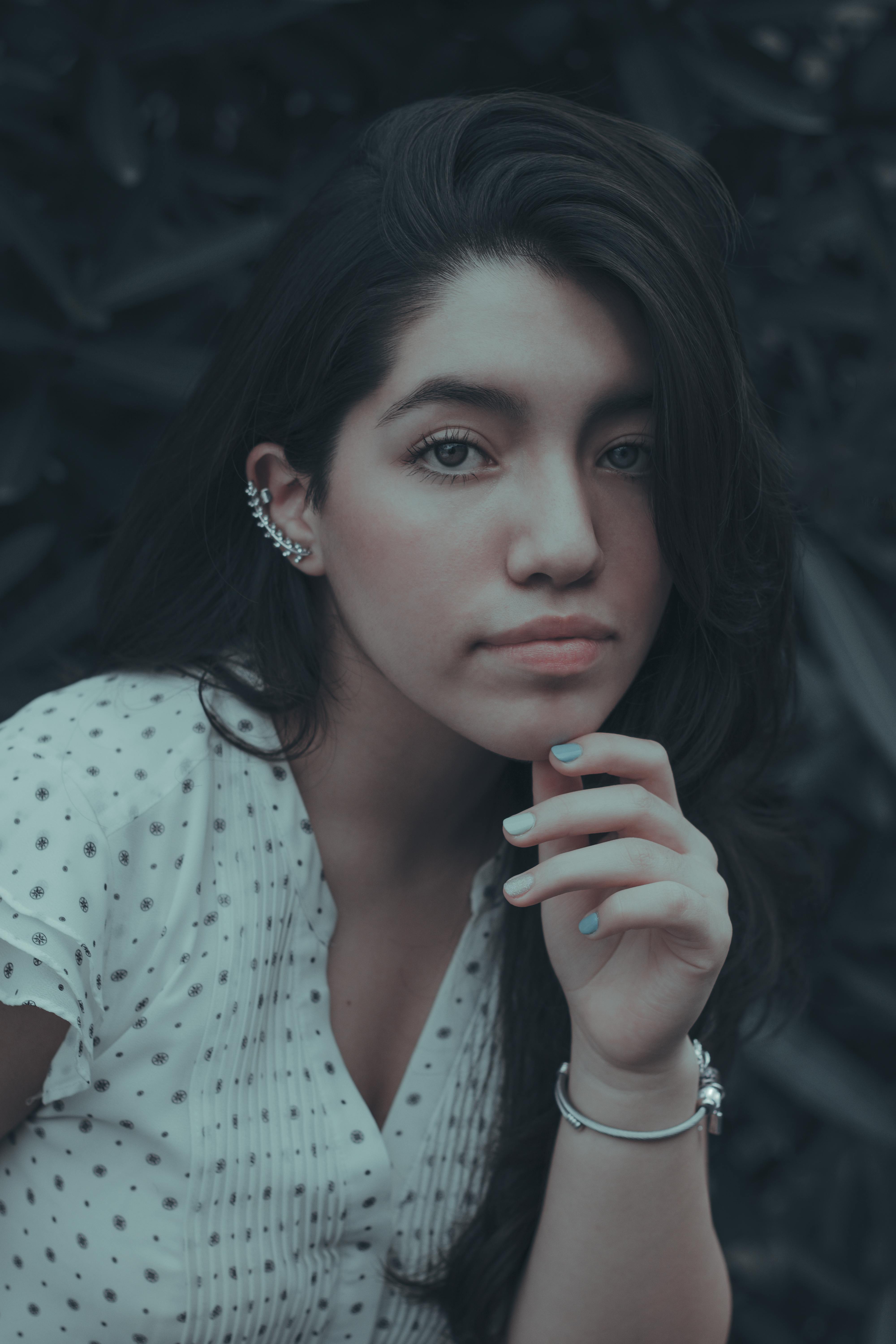 Portrait of Woman with Hand under Chin · Free Stock Photo