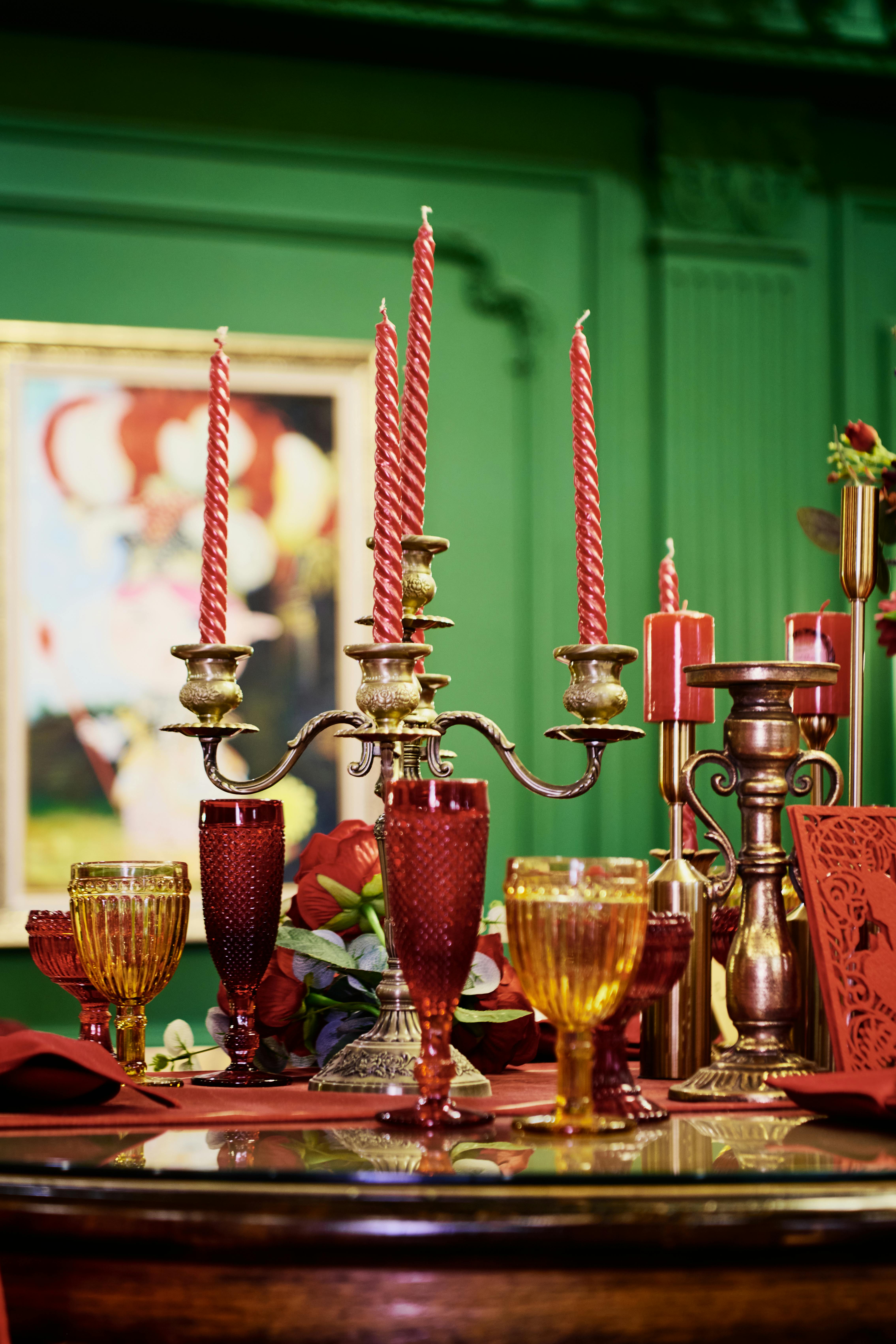 Wax Candles in Candlesticks on Table · Free Stock Photo