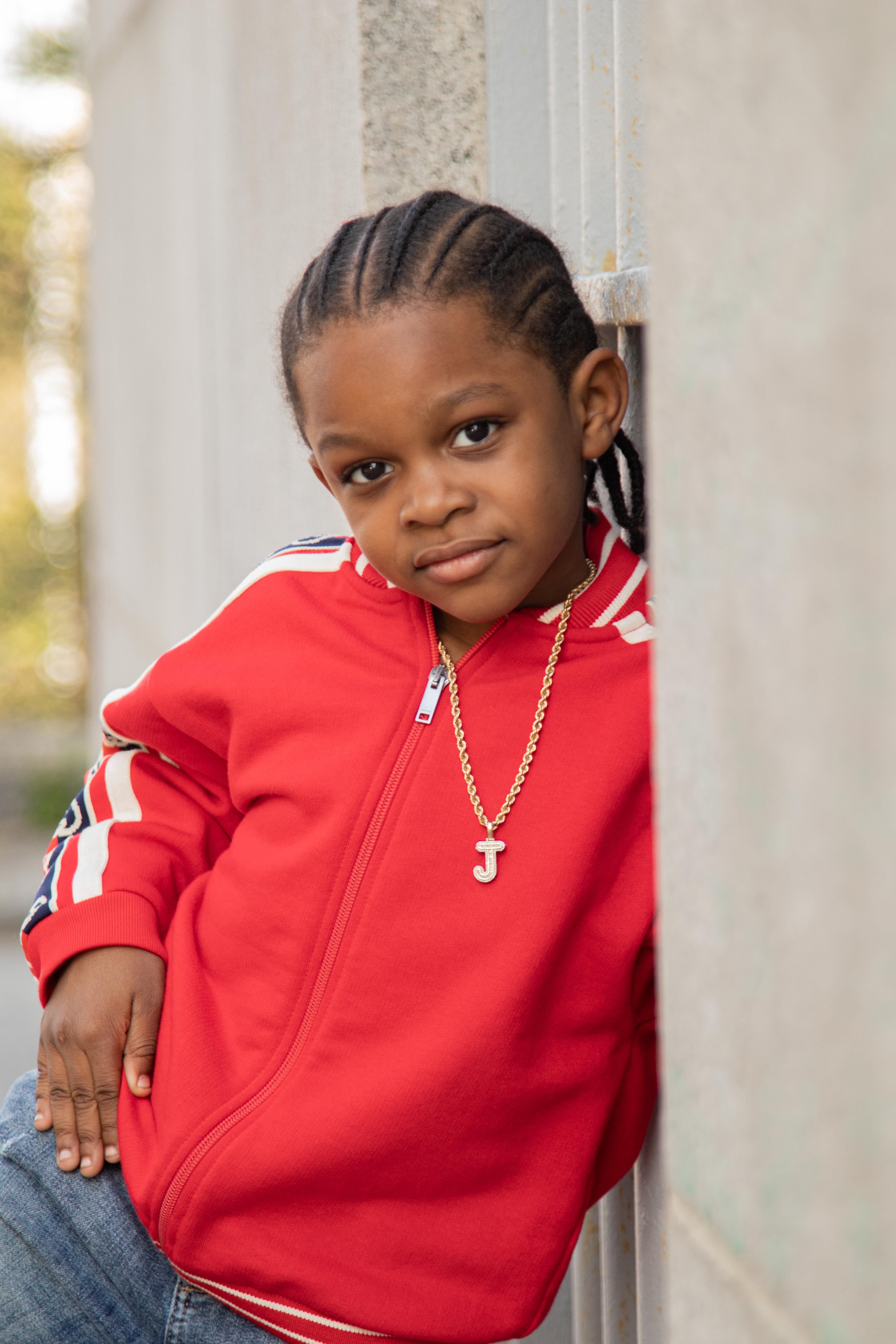 Portrait of a Girl Wearing Red Jumper · Free Stock Photo