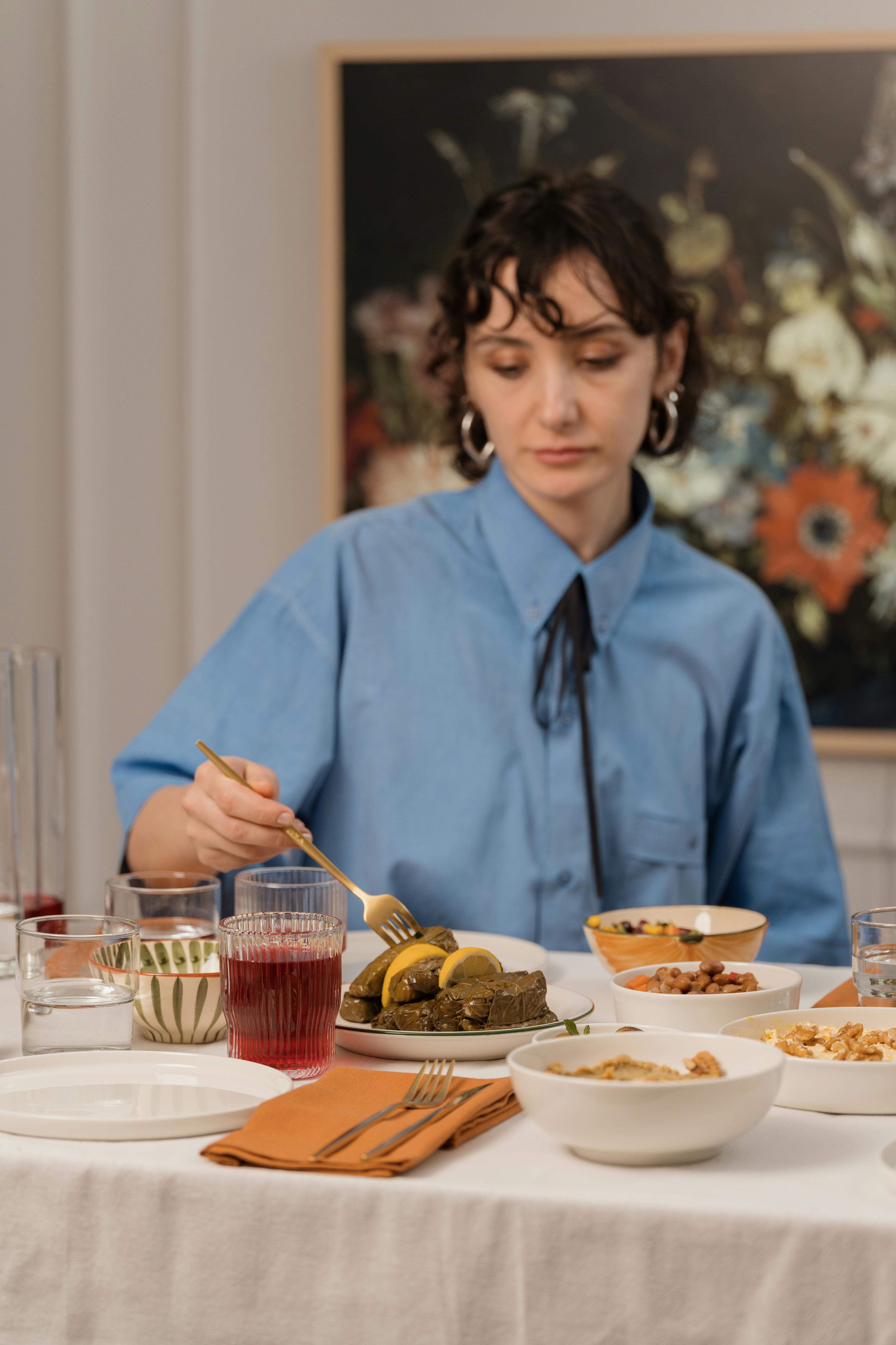 Woman Eating Dinner · Free Stock Photo