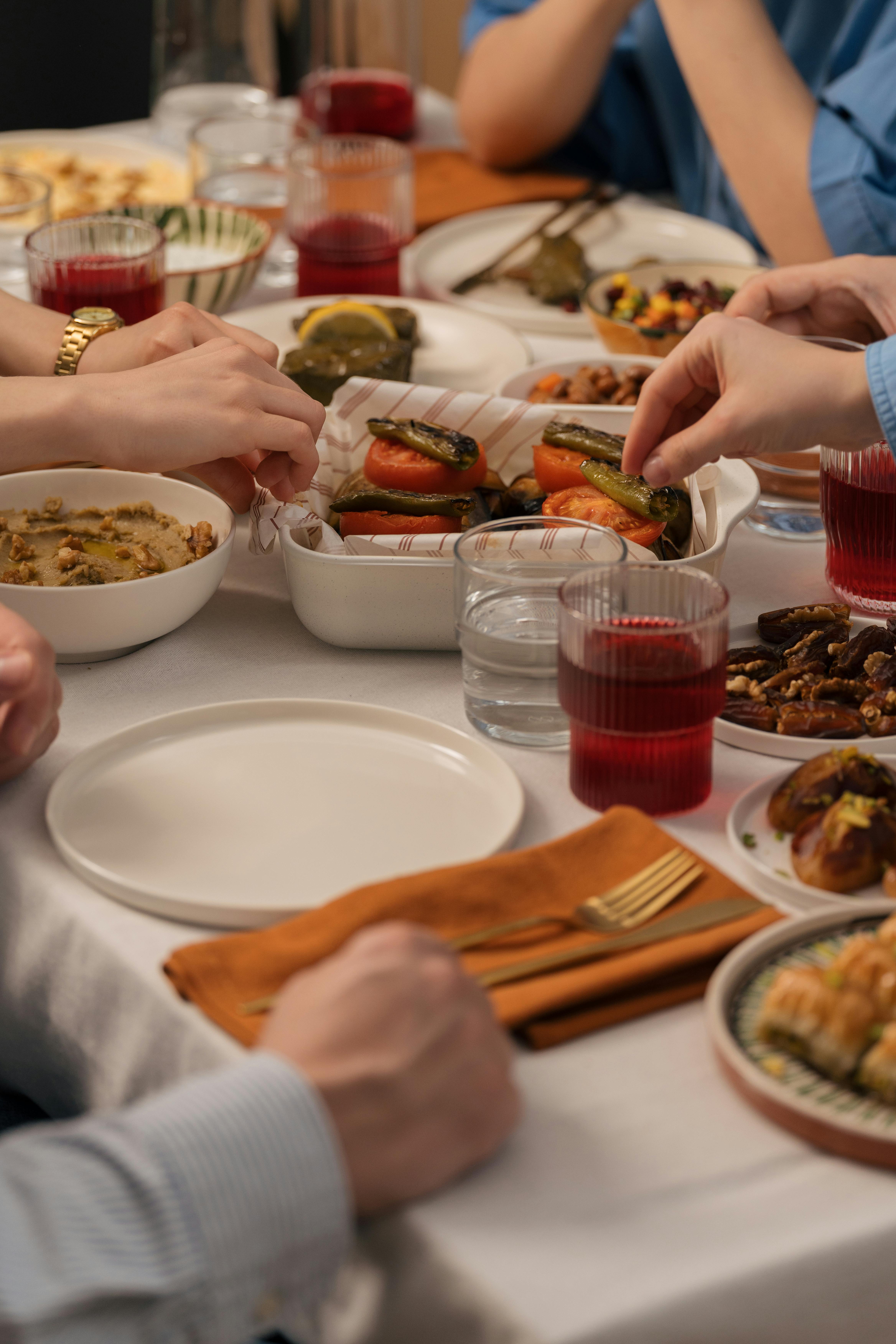 People Hands over Table with Food · Free Stock Photo