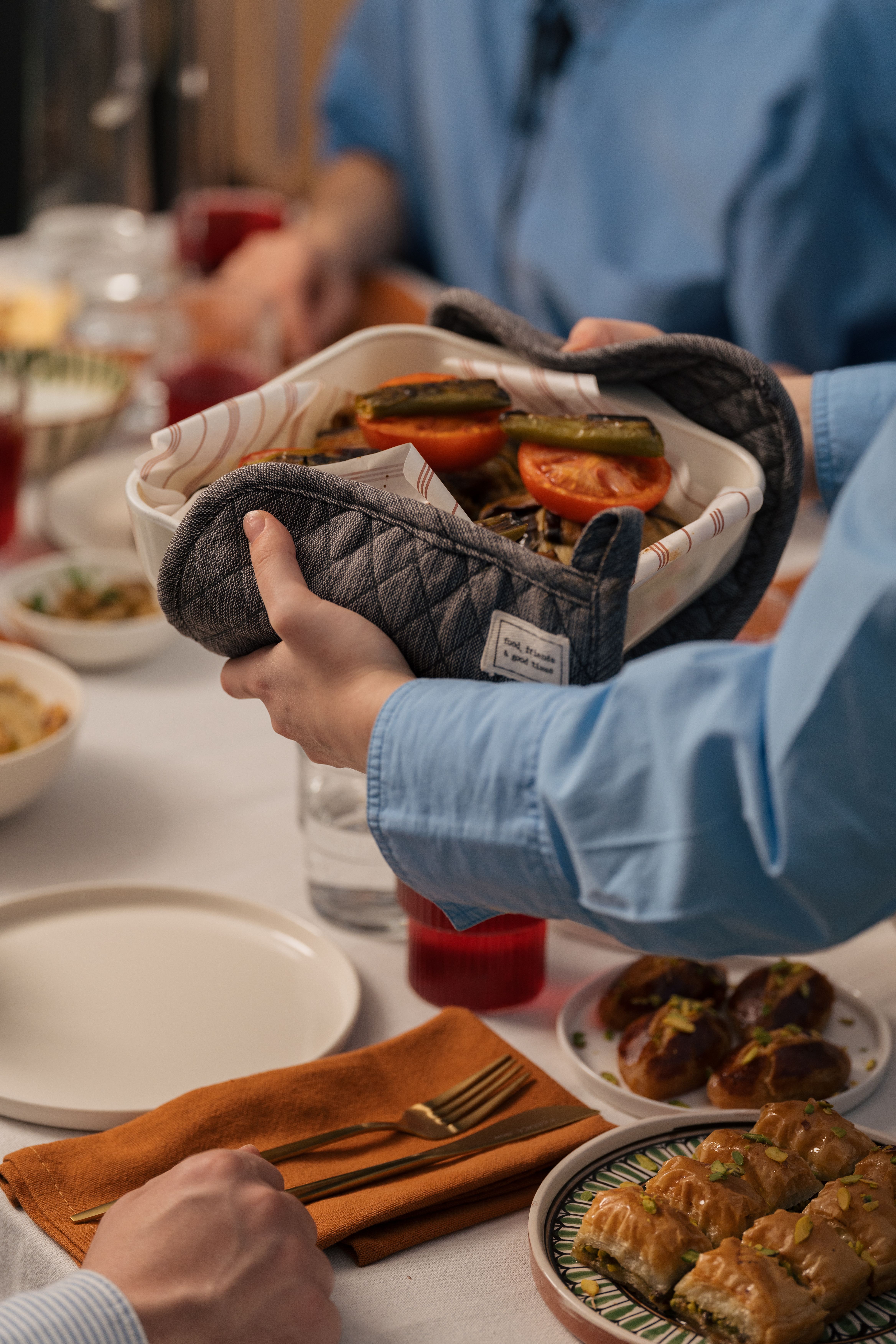 Person Hands Holding Food over Table · Free Stock Photo