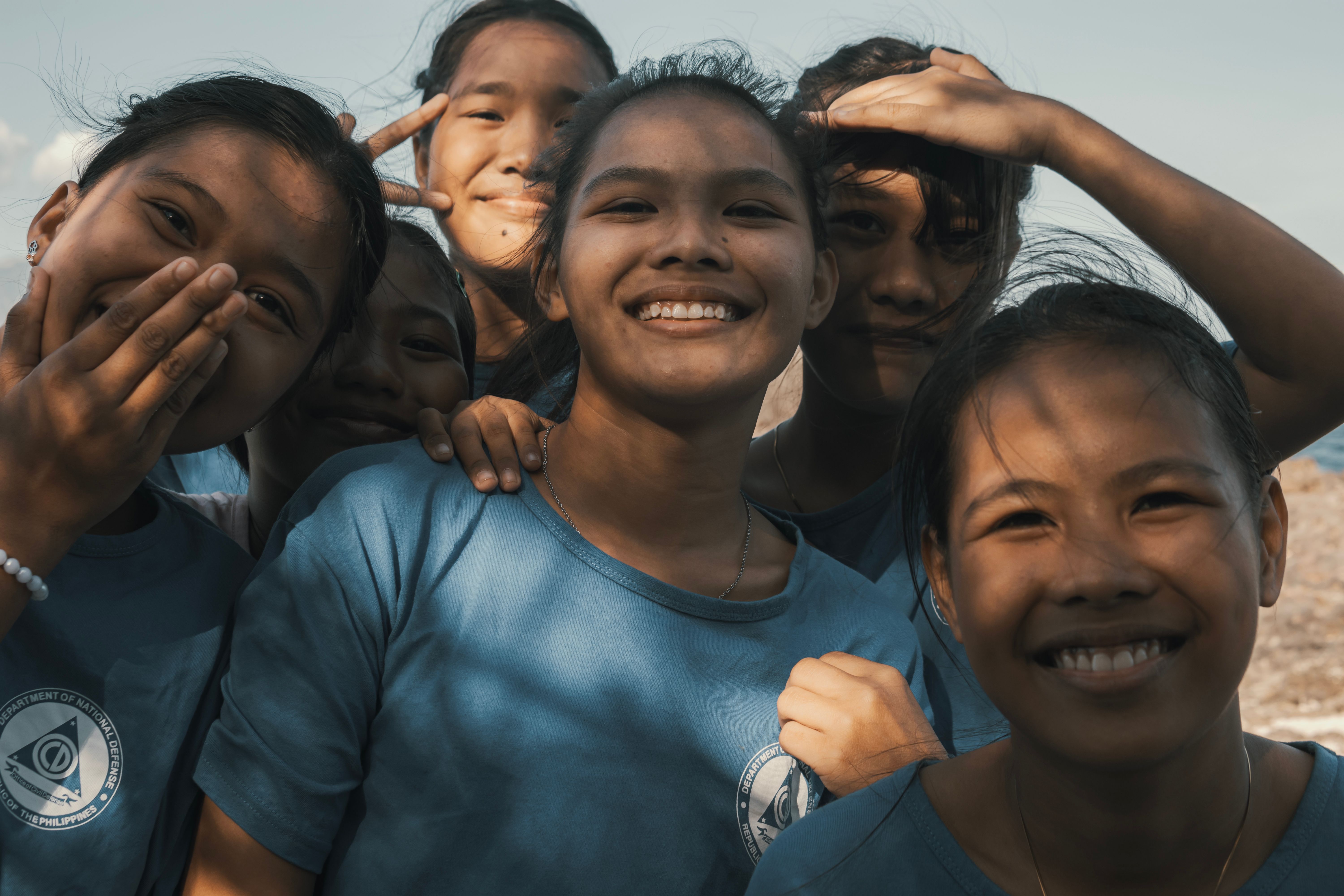 A Group of People Posing · Free Stock Photo