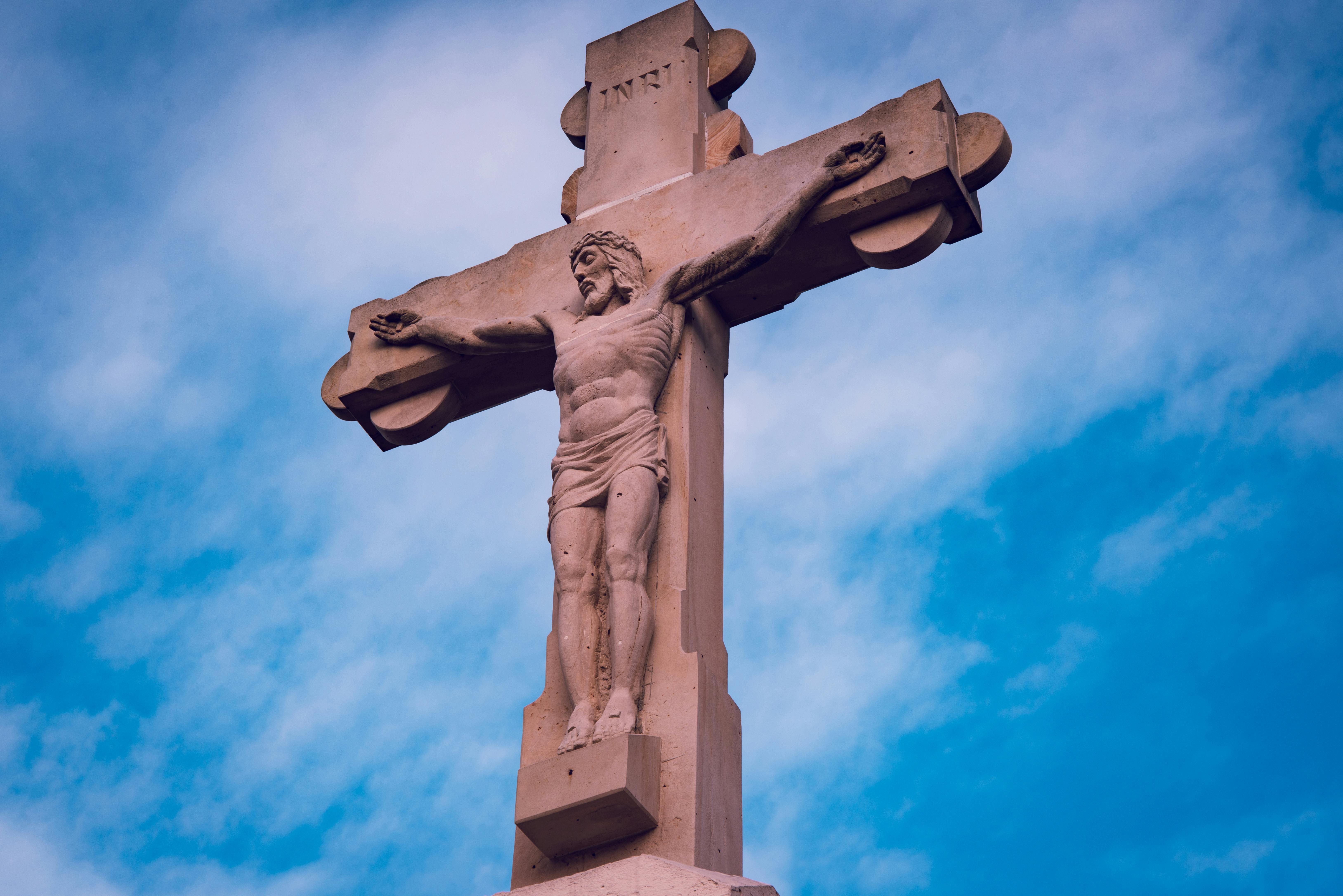 Large Crucifix Standing against the Sky · Free Stock Photo
