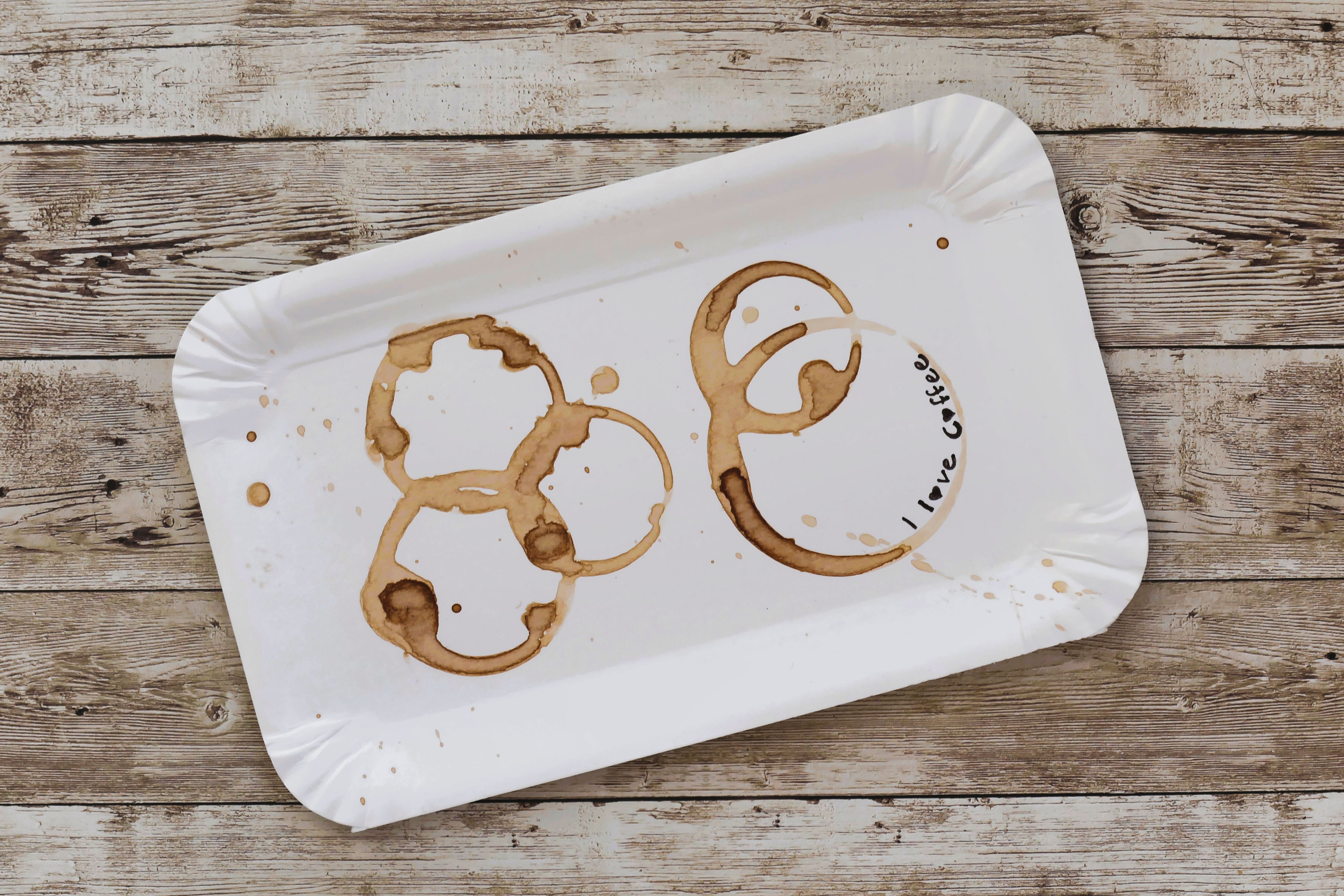 Coffee Stains on a White Paper Tray · Free Stock Photo