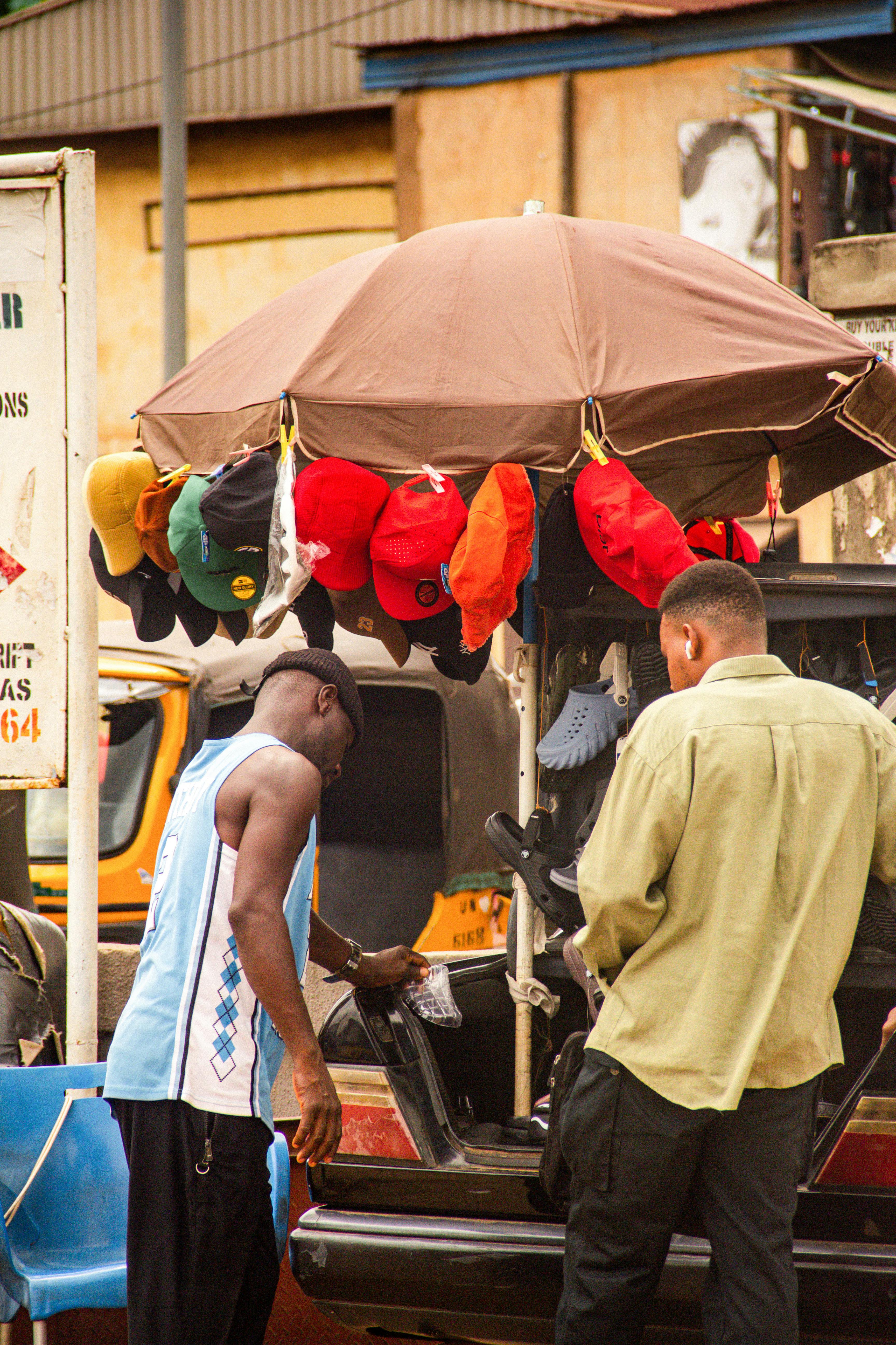 Merchant Selling from Car Trunk · Free Stock Photo