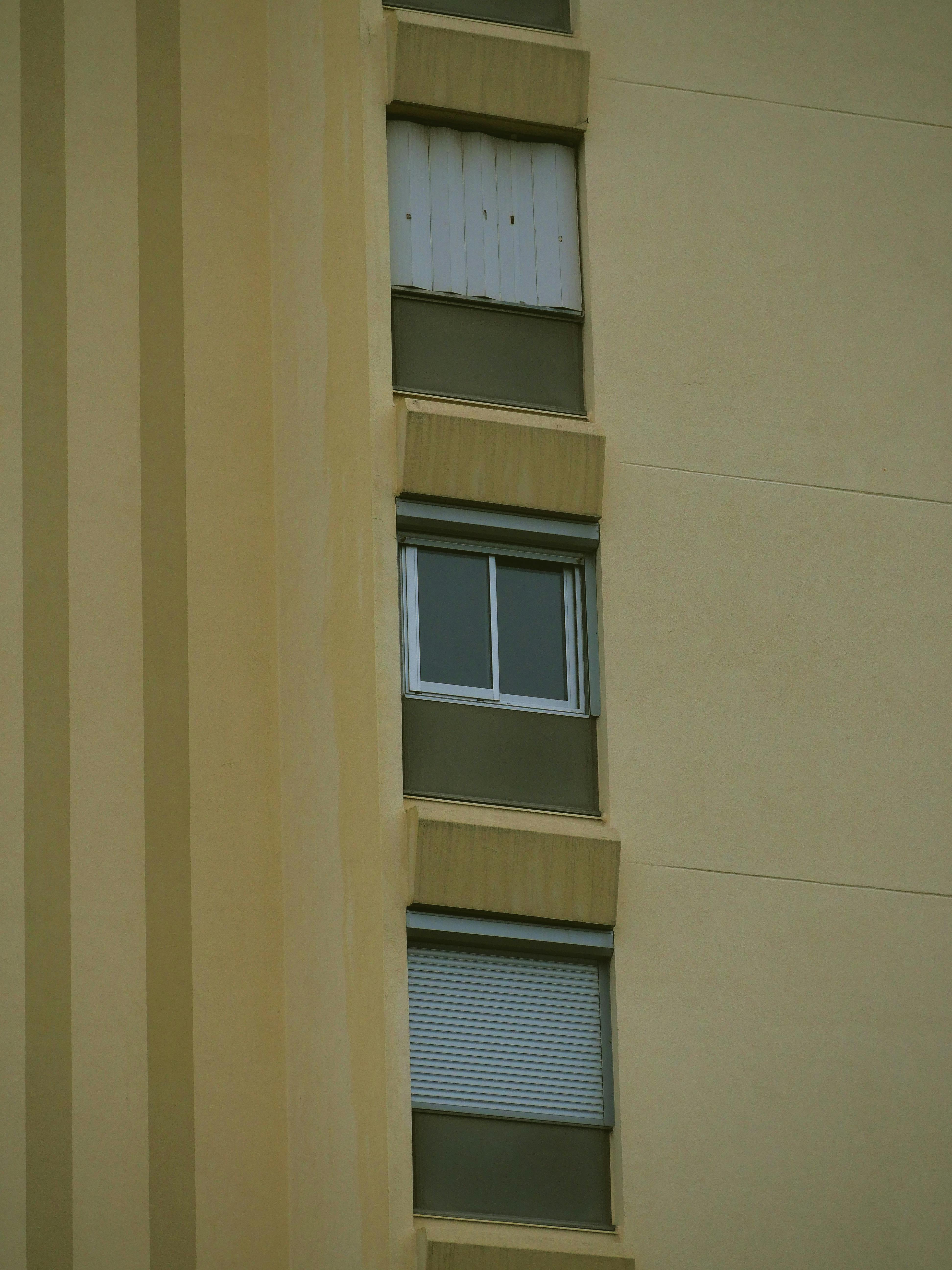 Close-up of the Windows in an Apartment Block · Free Stock Photo