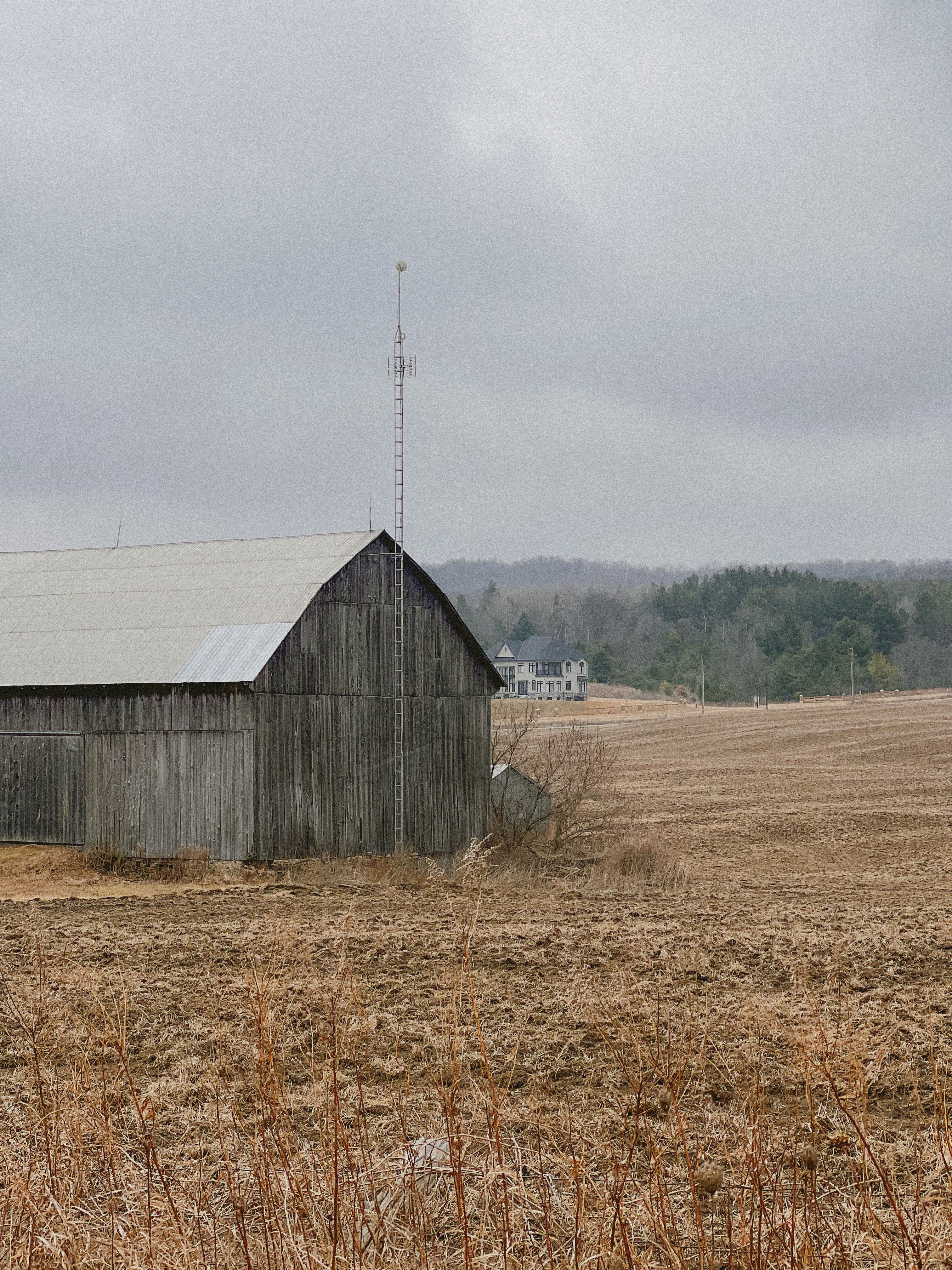 Wooden Barn on a Dry Field · Free Stock Photo