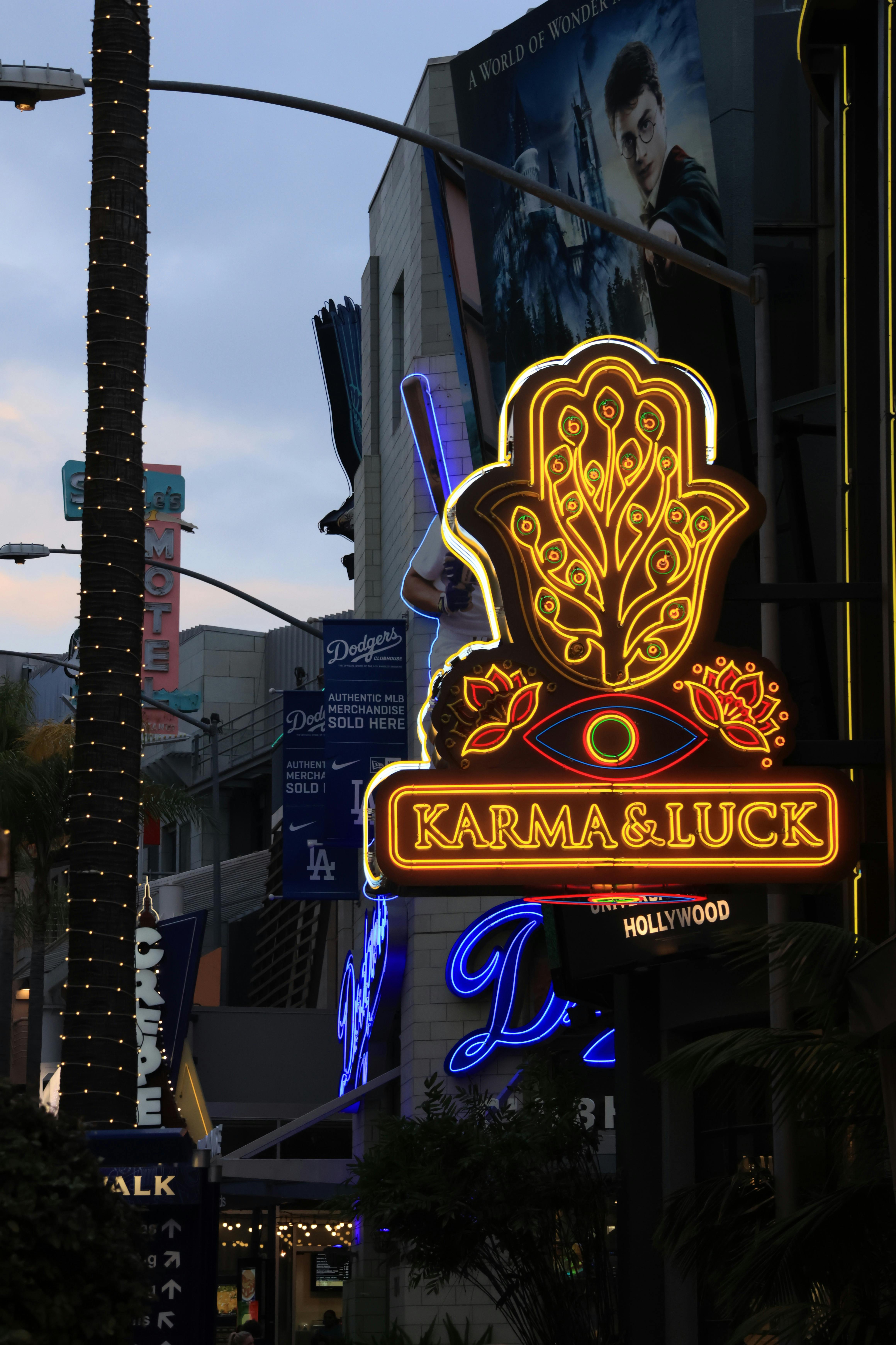 Neon Sign Karma and Luck and the Harry Potter Poster on the Cinema Next ...