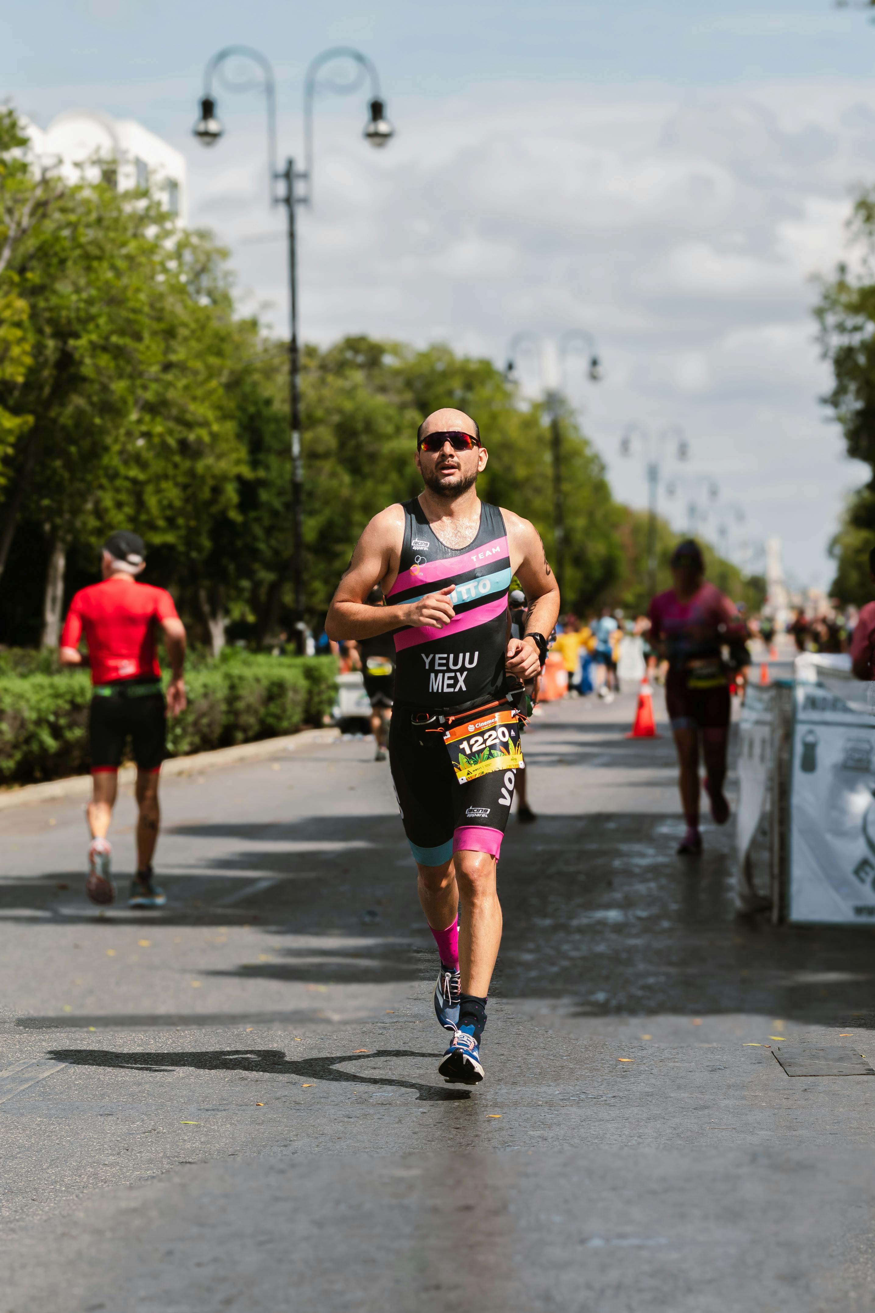 Men Running a Marathon on a Street · Free Stock Photo
