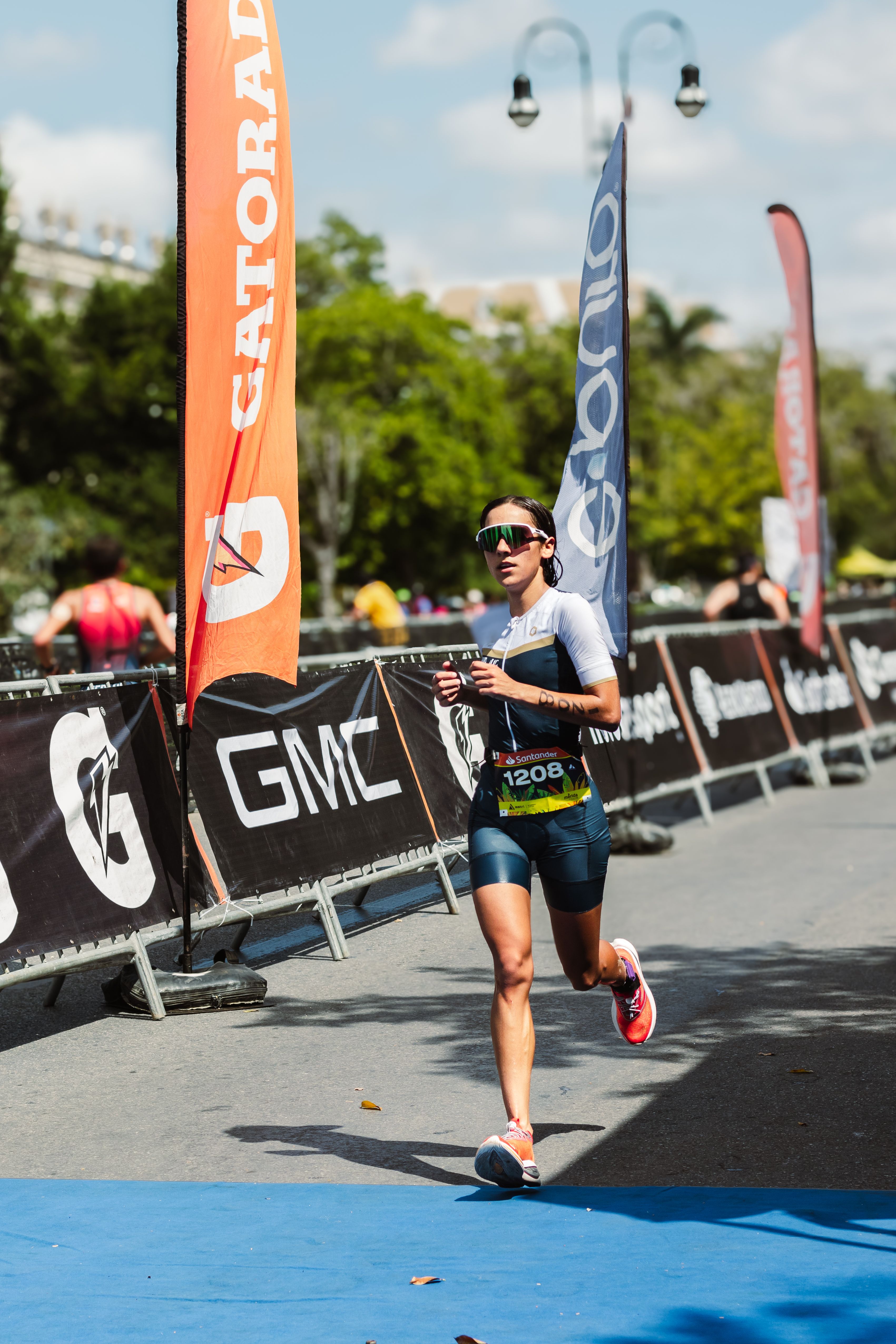 Photo of a Woman Running a Marathon · Free Stock Photo