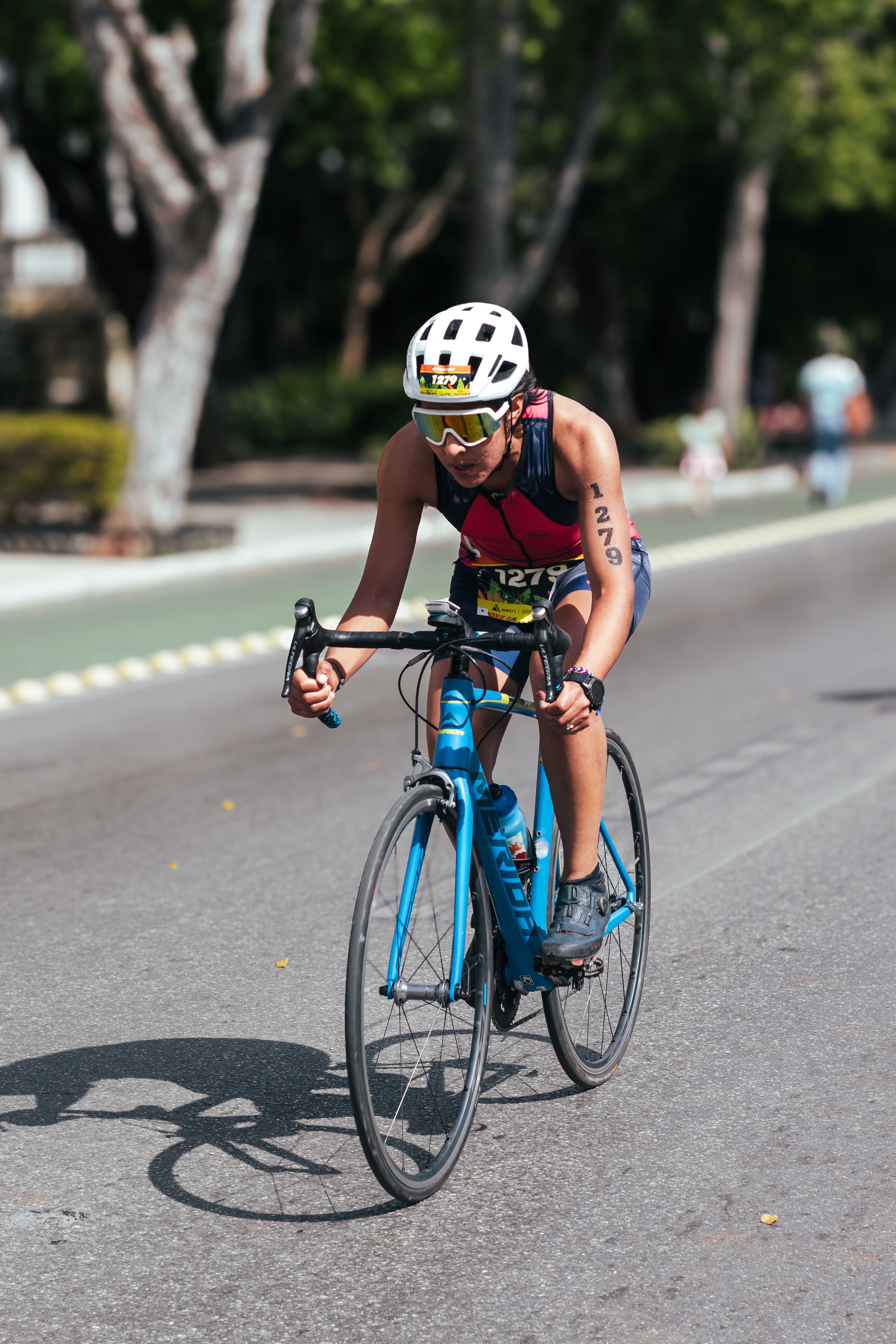 Cyclist Racing Down the Street · Free Stock Photo