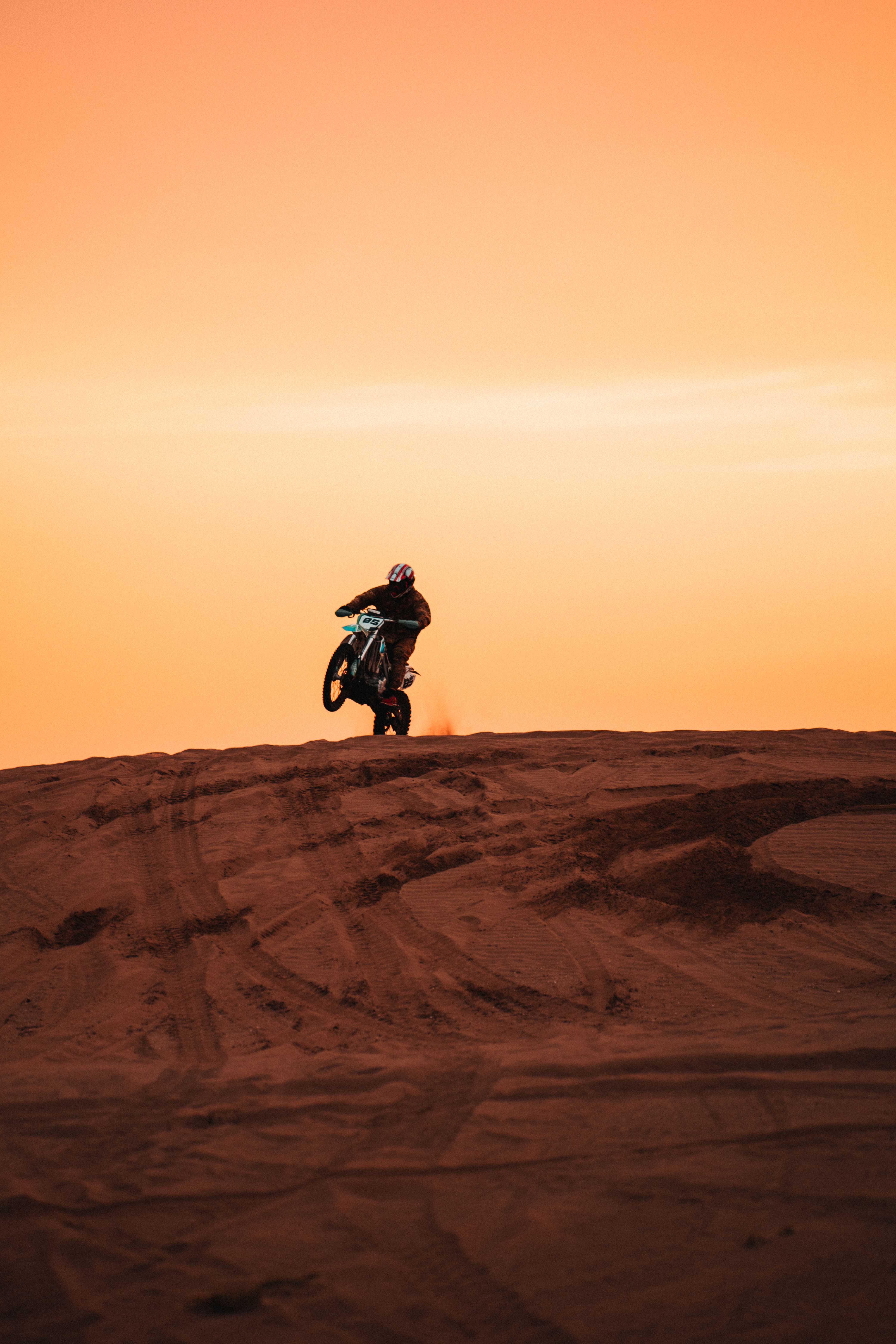 Biker Riding through the Desert · Free Stock Photo
