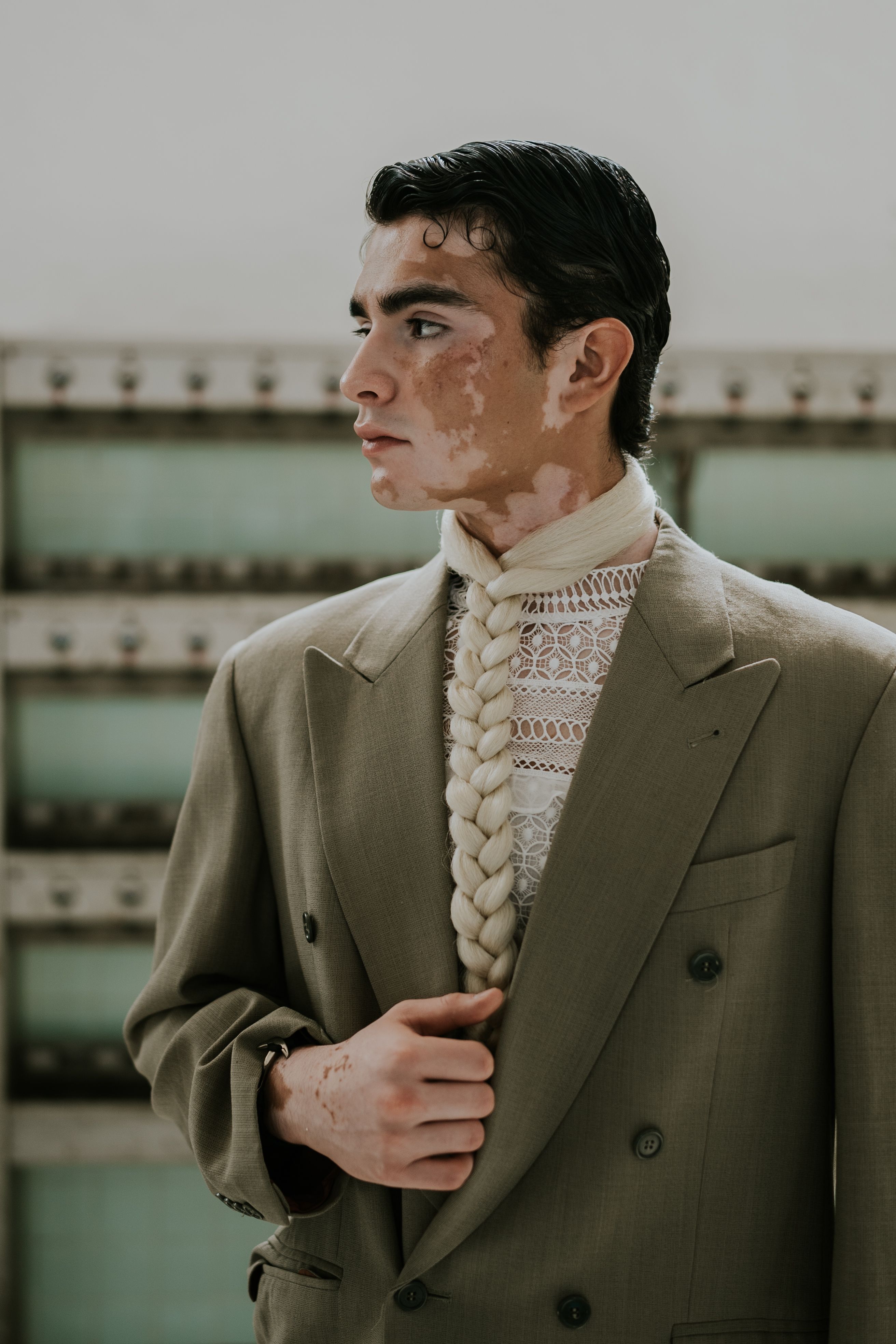 Model in an Olive Blazer and Braided Tie · Free Stock Photo