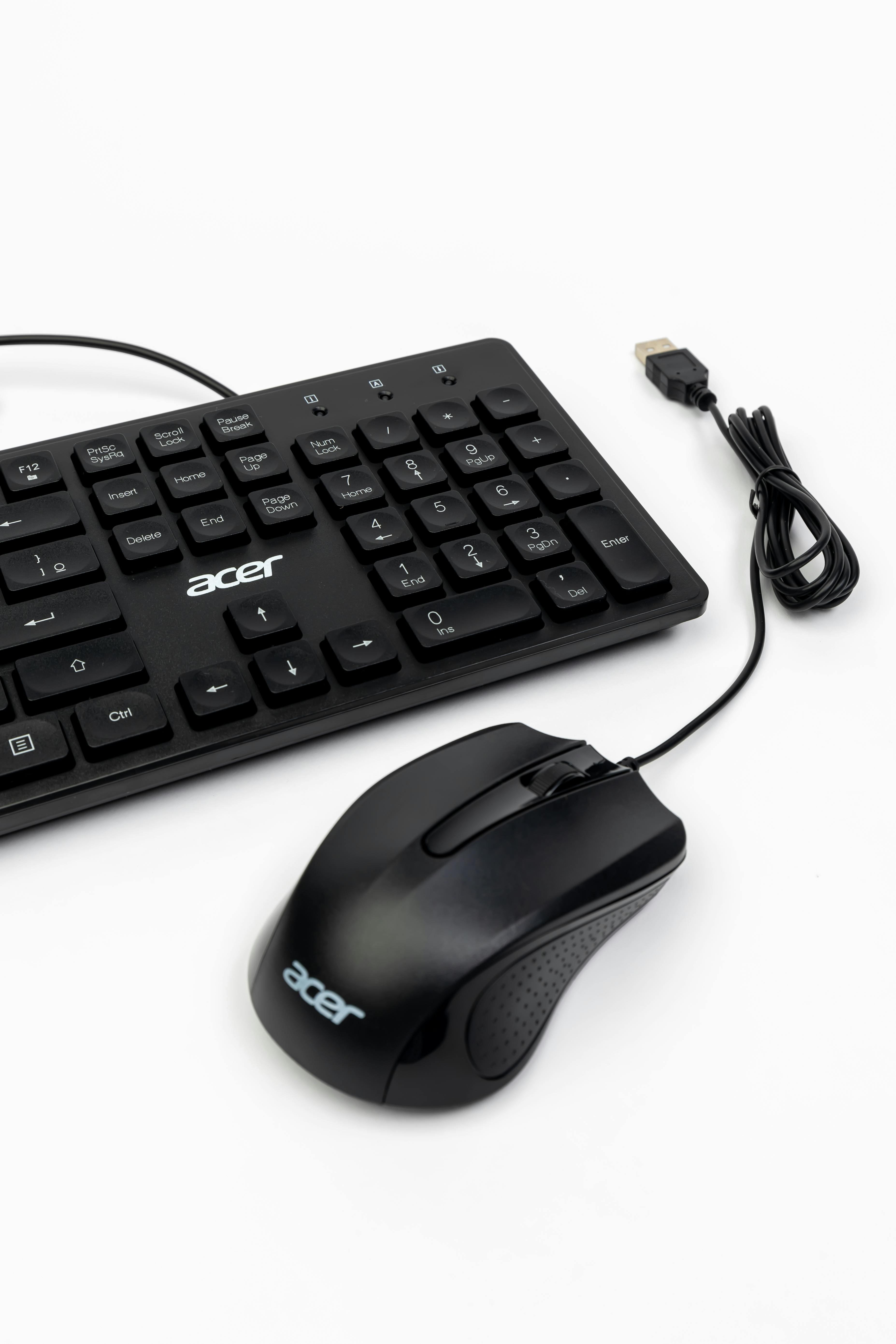 A Black Computer Keyboard and Mouse on White Background · Free Stock Photo
