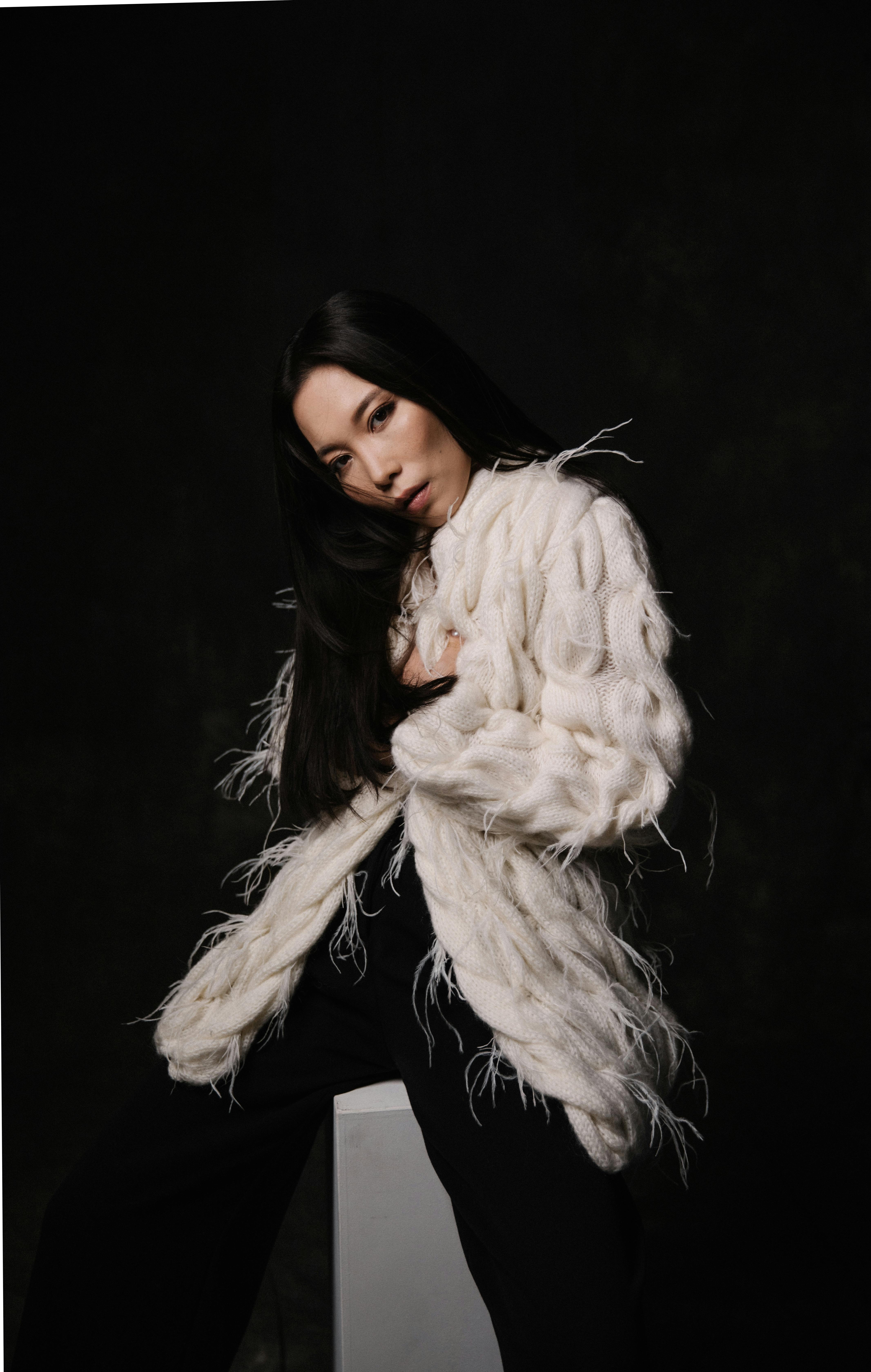 Woman in Wool Sweater against Black Back · Free Stock Photo