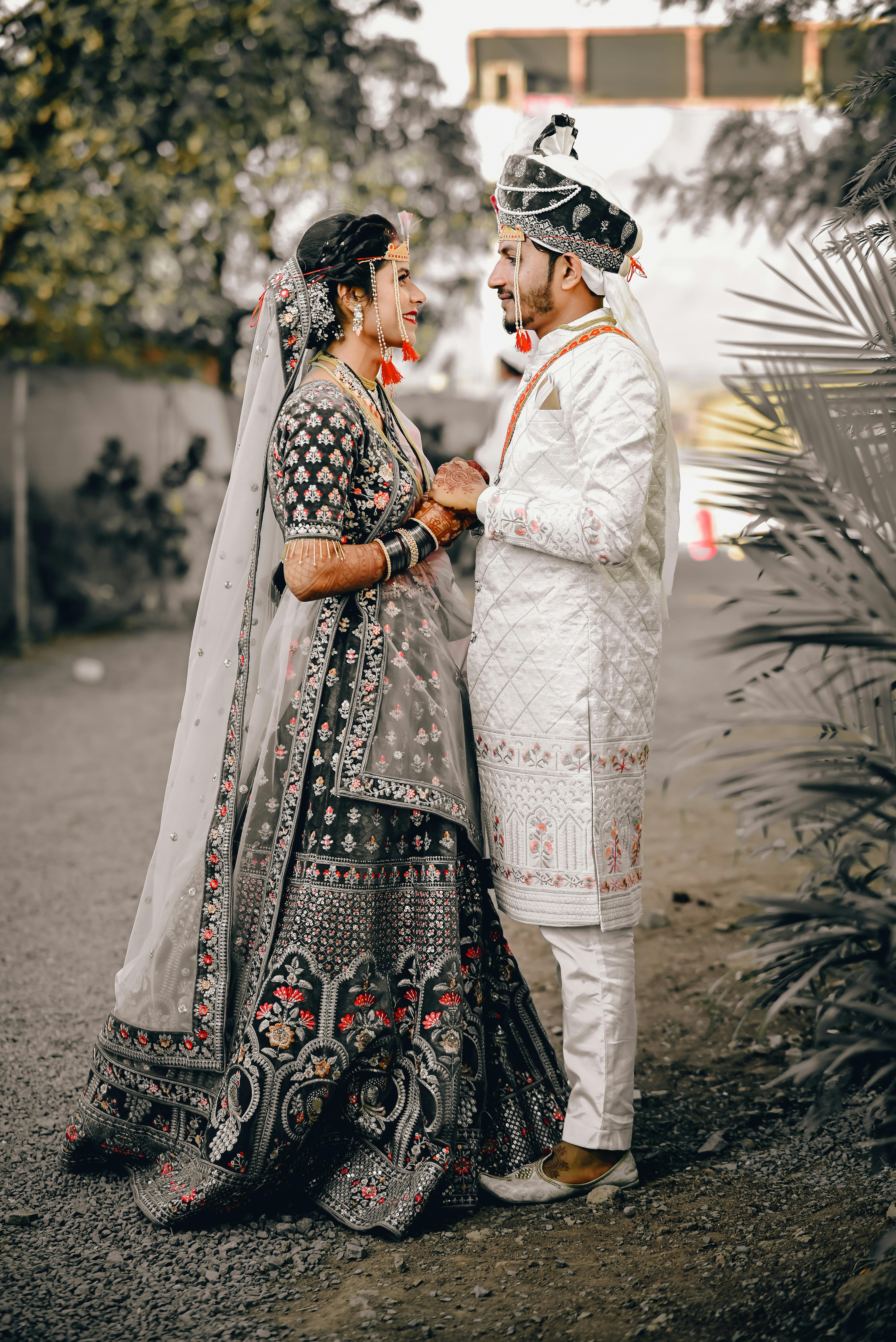 Hindu Bride and Groom in Traditional Clothing Holding each Other · Free ...