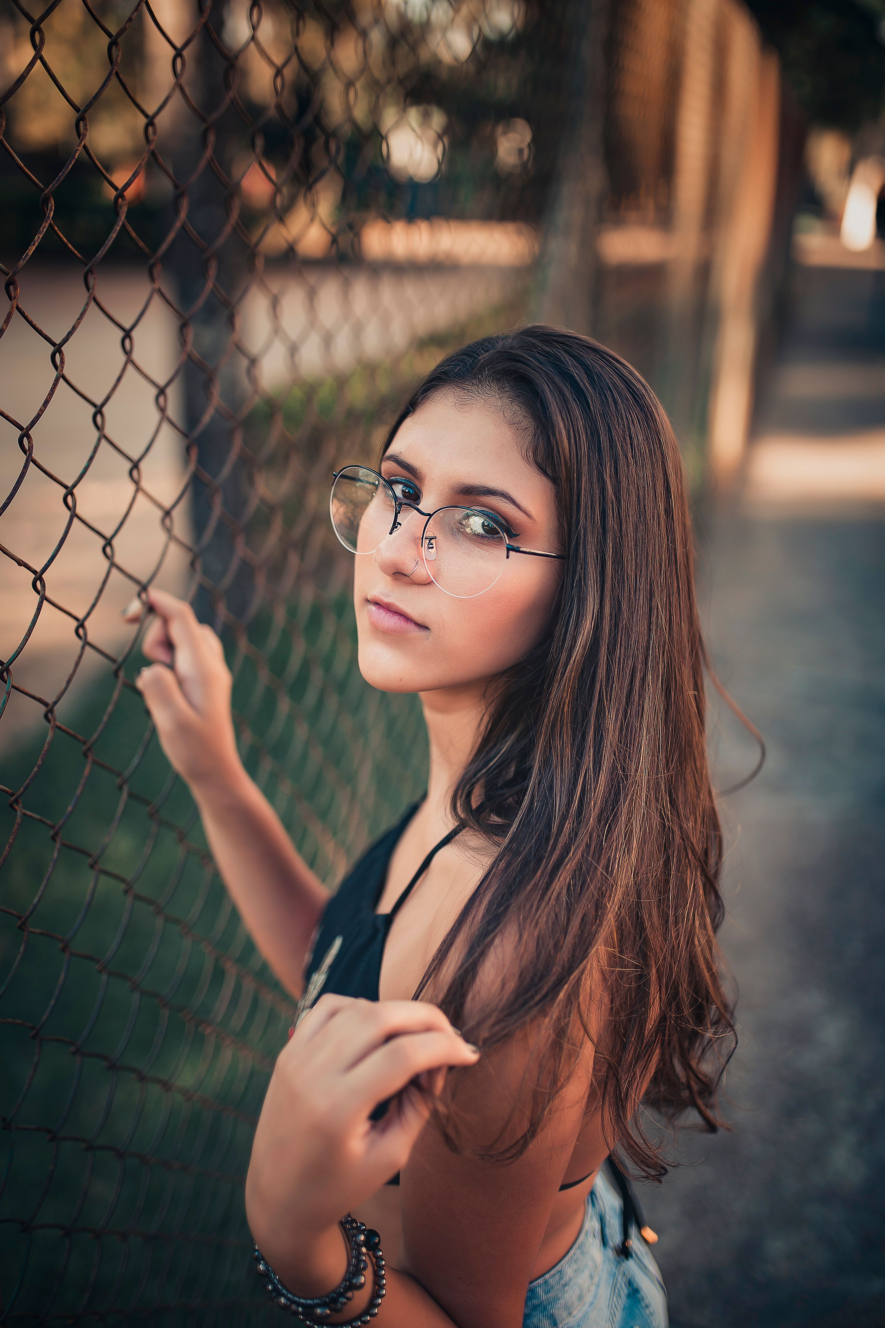Woman Standing and Facing the Wall · Free Stock Photo