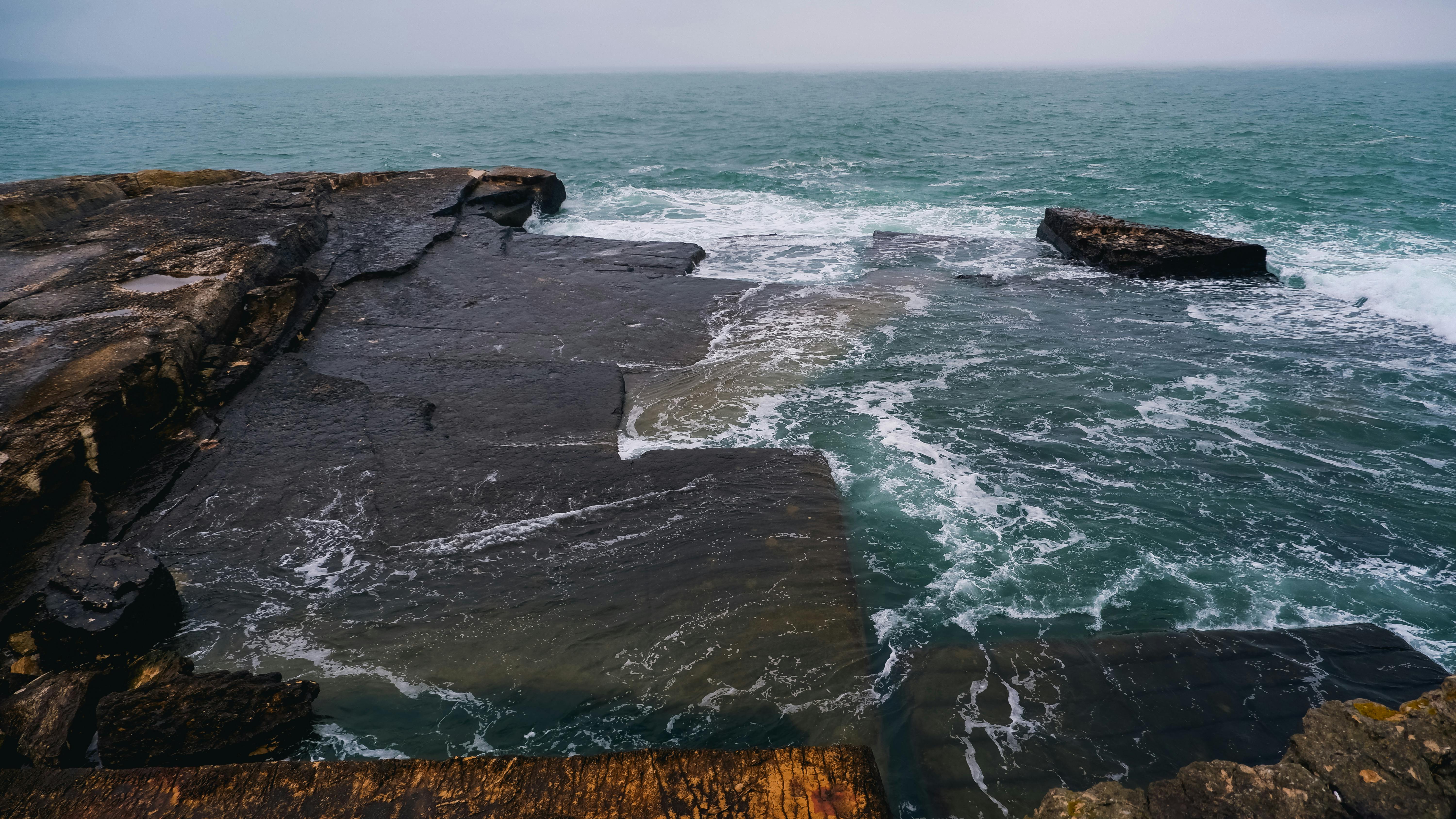 Waves of a Sea Hitting the Cliff · Free Stock Photo