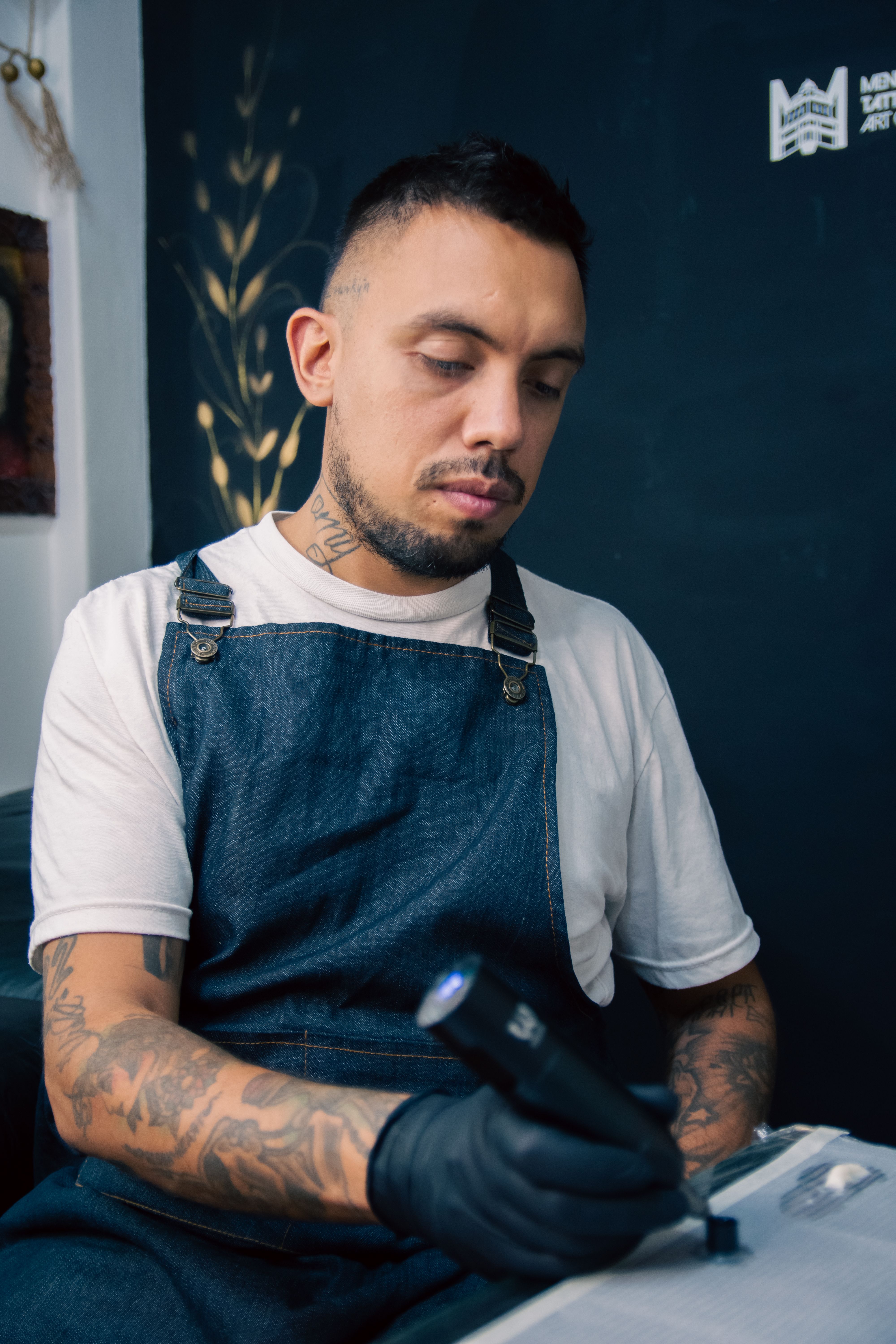A Tattoo Artist at Work · Free Stock Photo