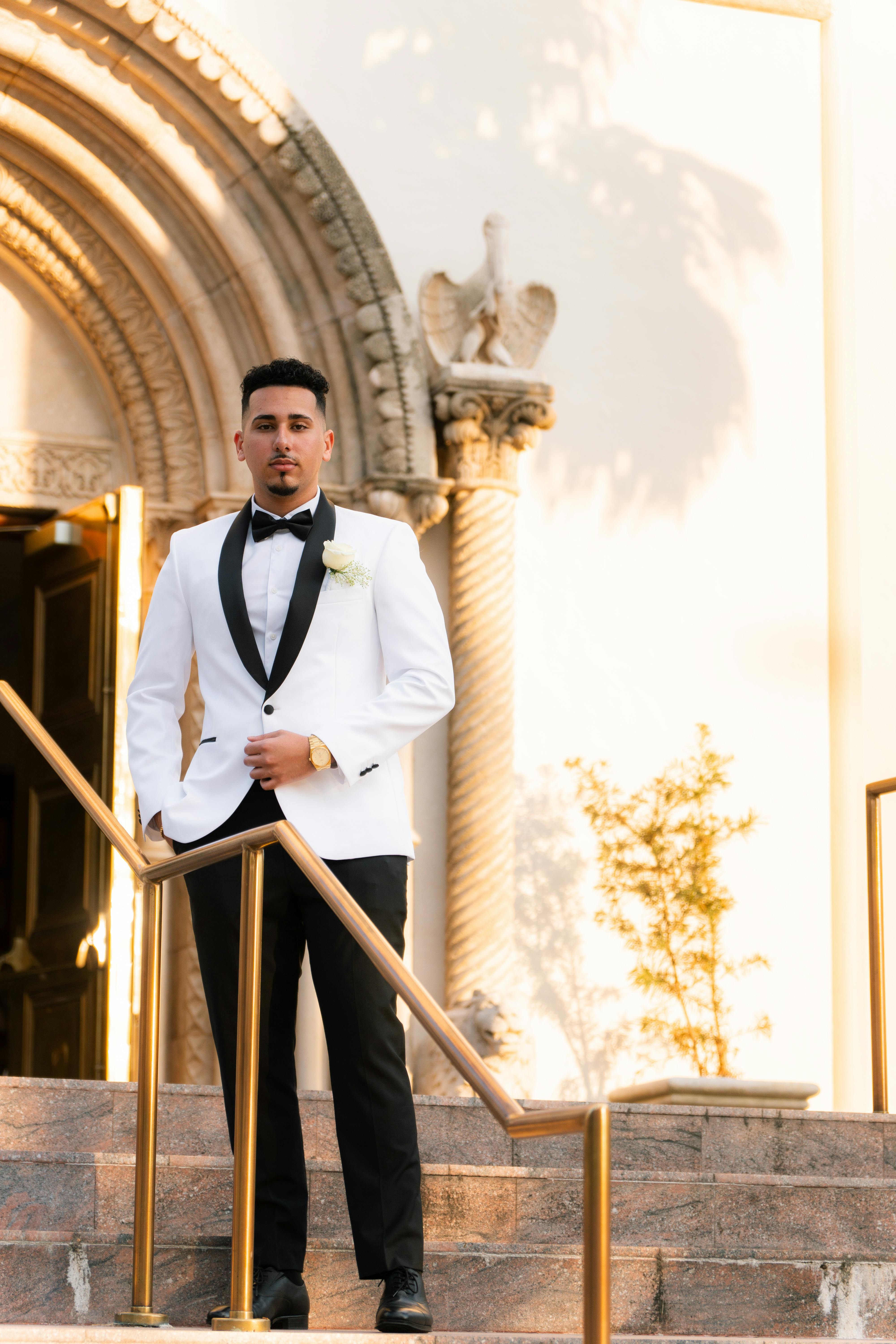 A Man Standing on Steps · Free Stock Photo