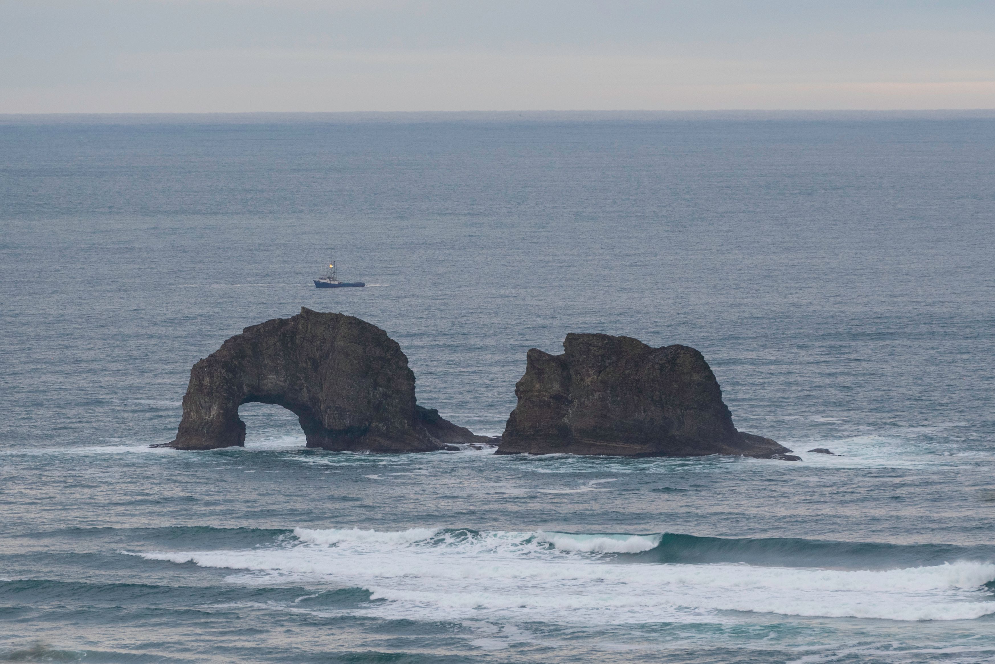 Rocks and Natural Arch on Sea Shore · Free Stock Photo