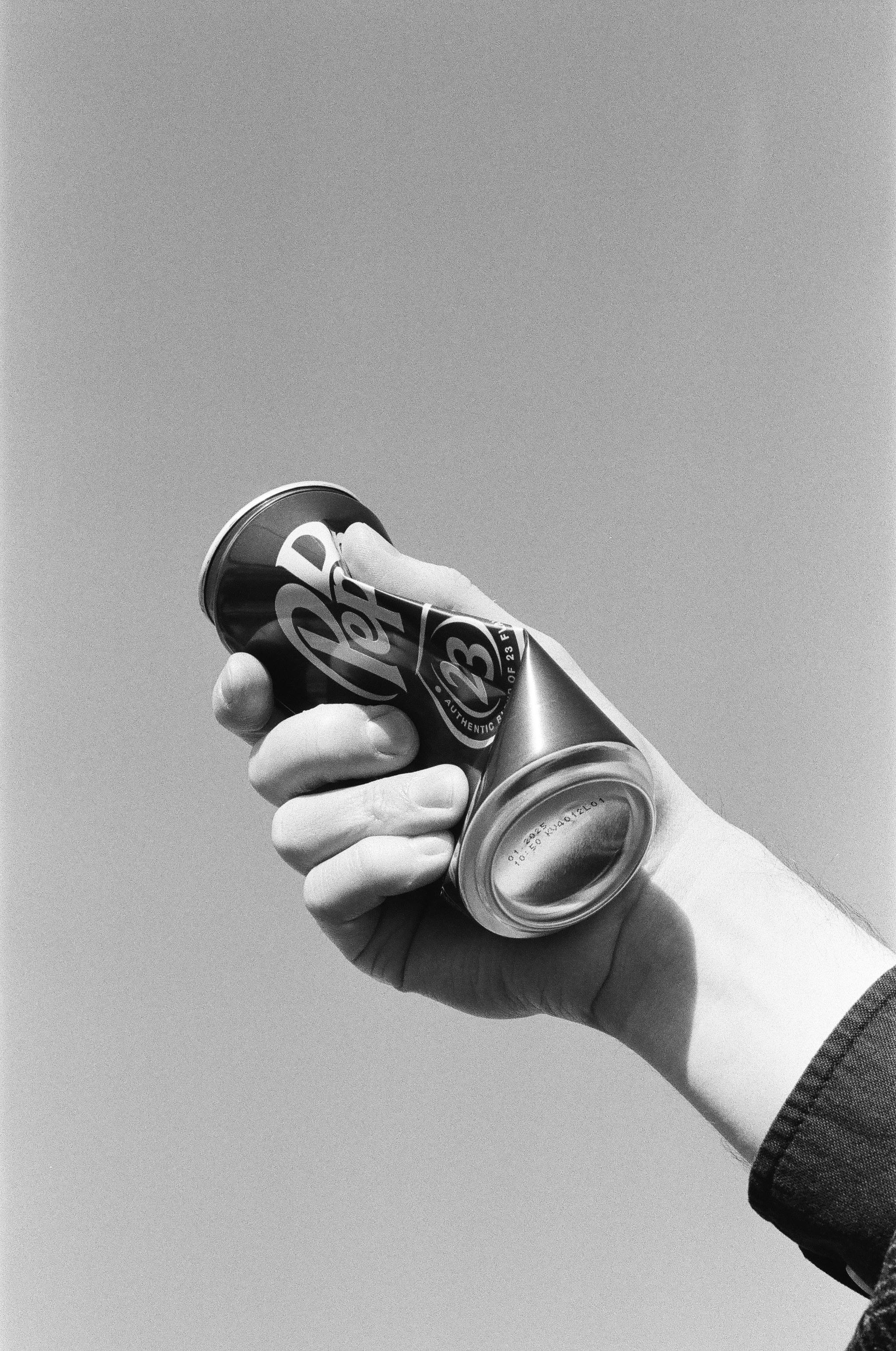 Hand Crushing Soda Can · Free Stock Photo