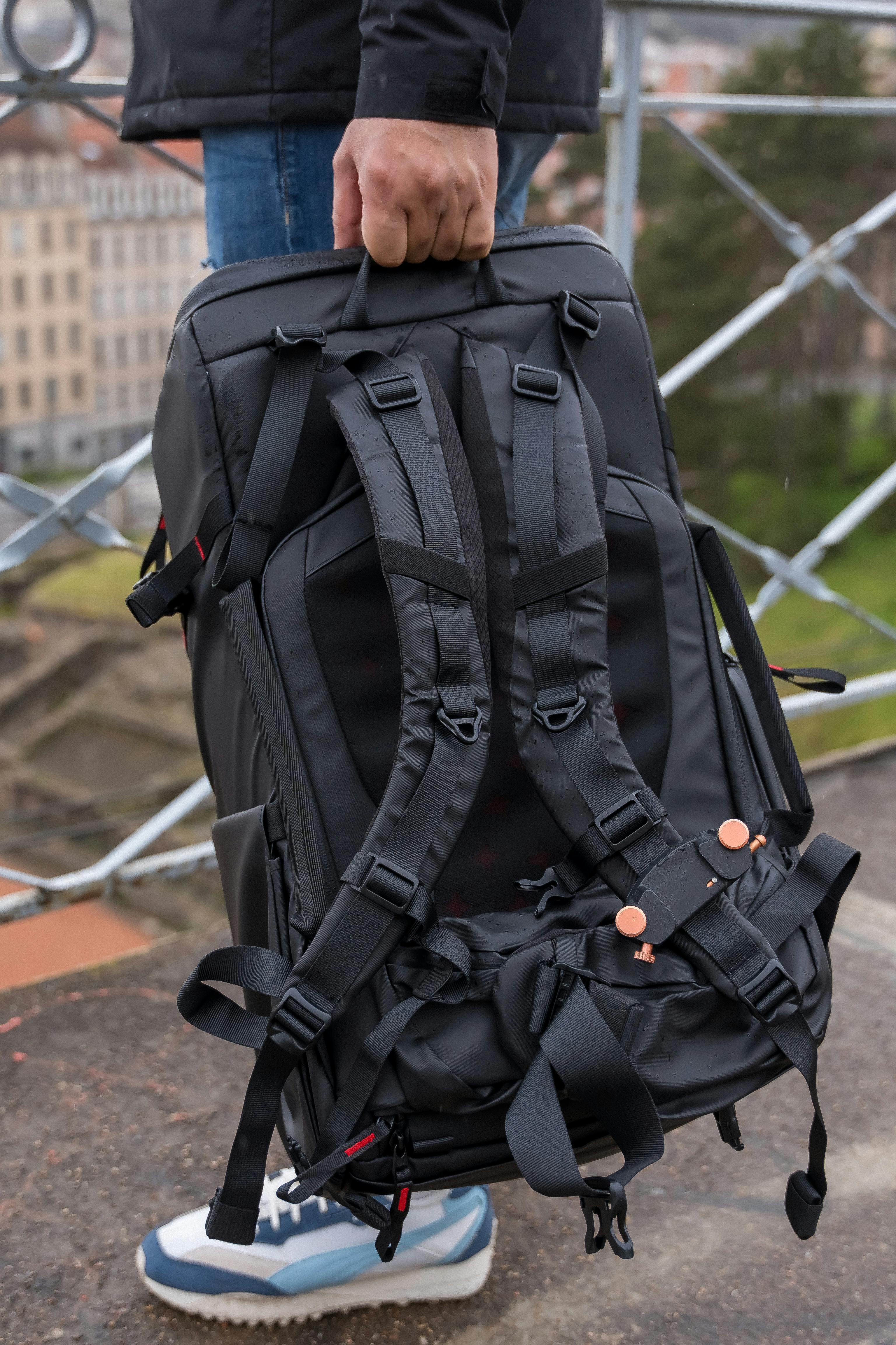 Man Hand Holding Backpack · Free Stock Photo