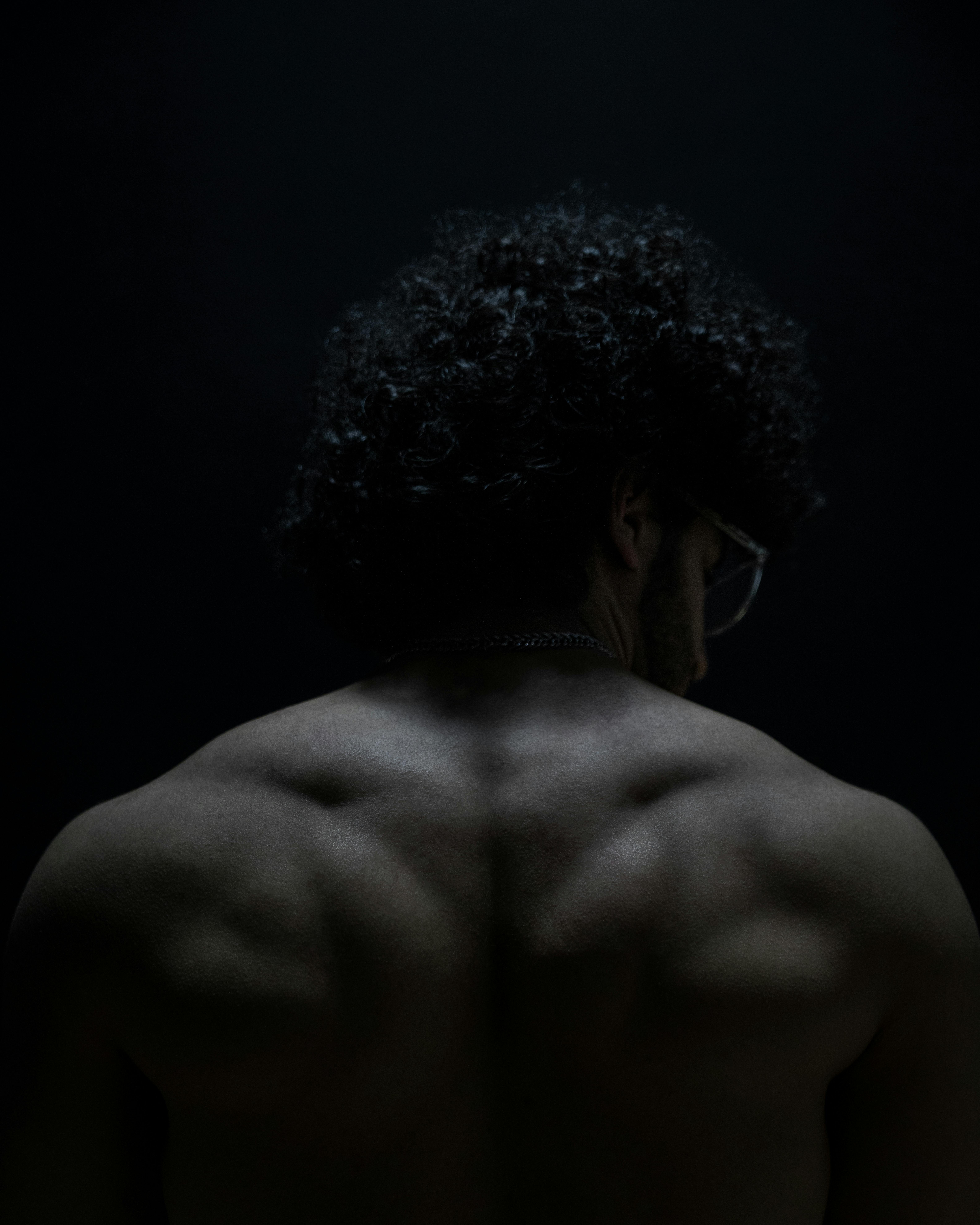 Black and White Back View Photo of a Muscular Man · Free Stock Photo