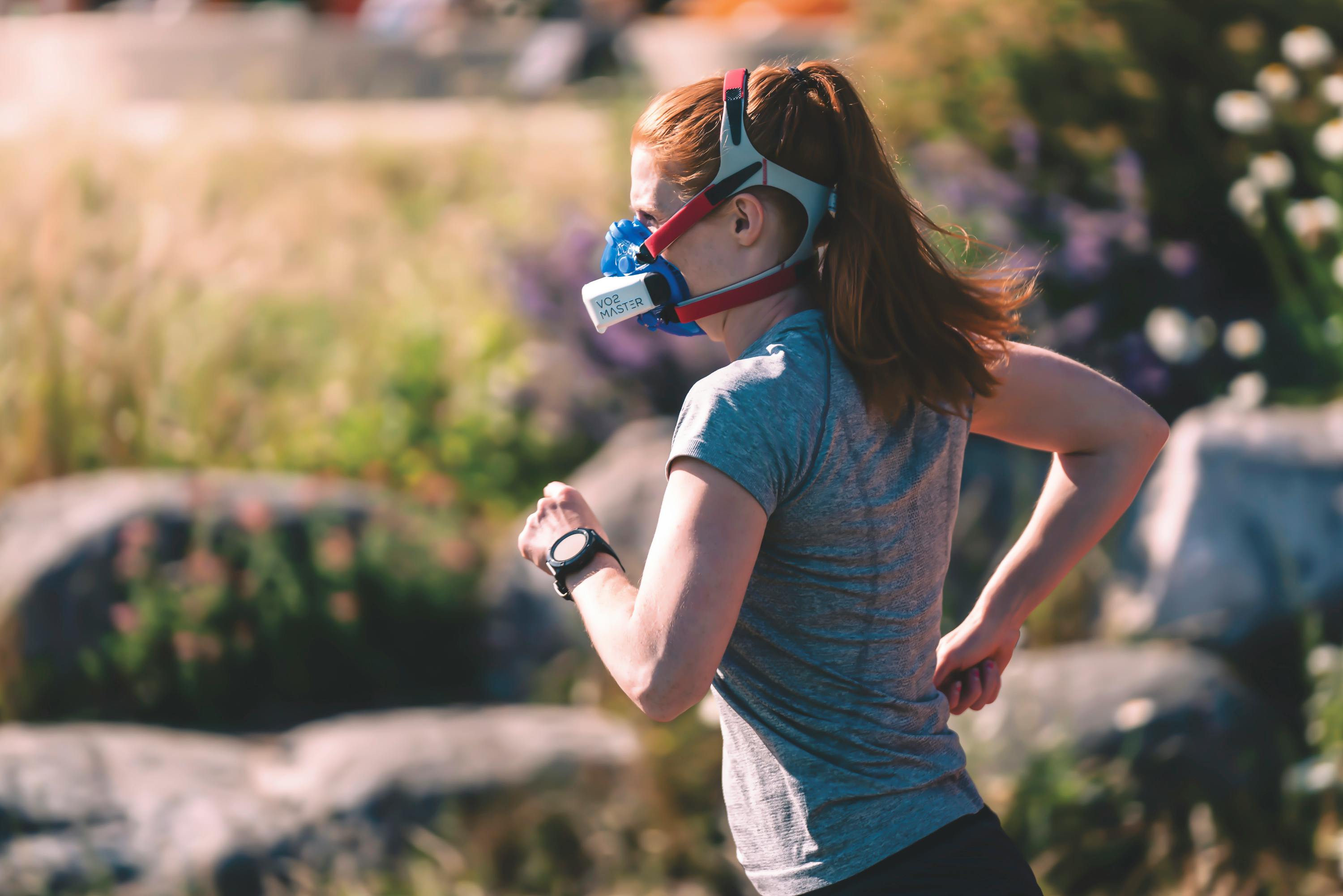 Woman Jogging in a Face Mask · Free Stock Photo