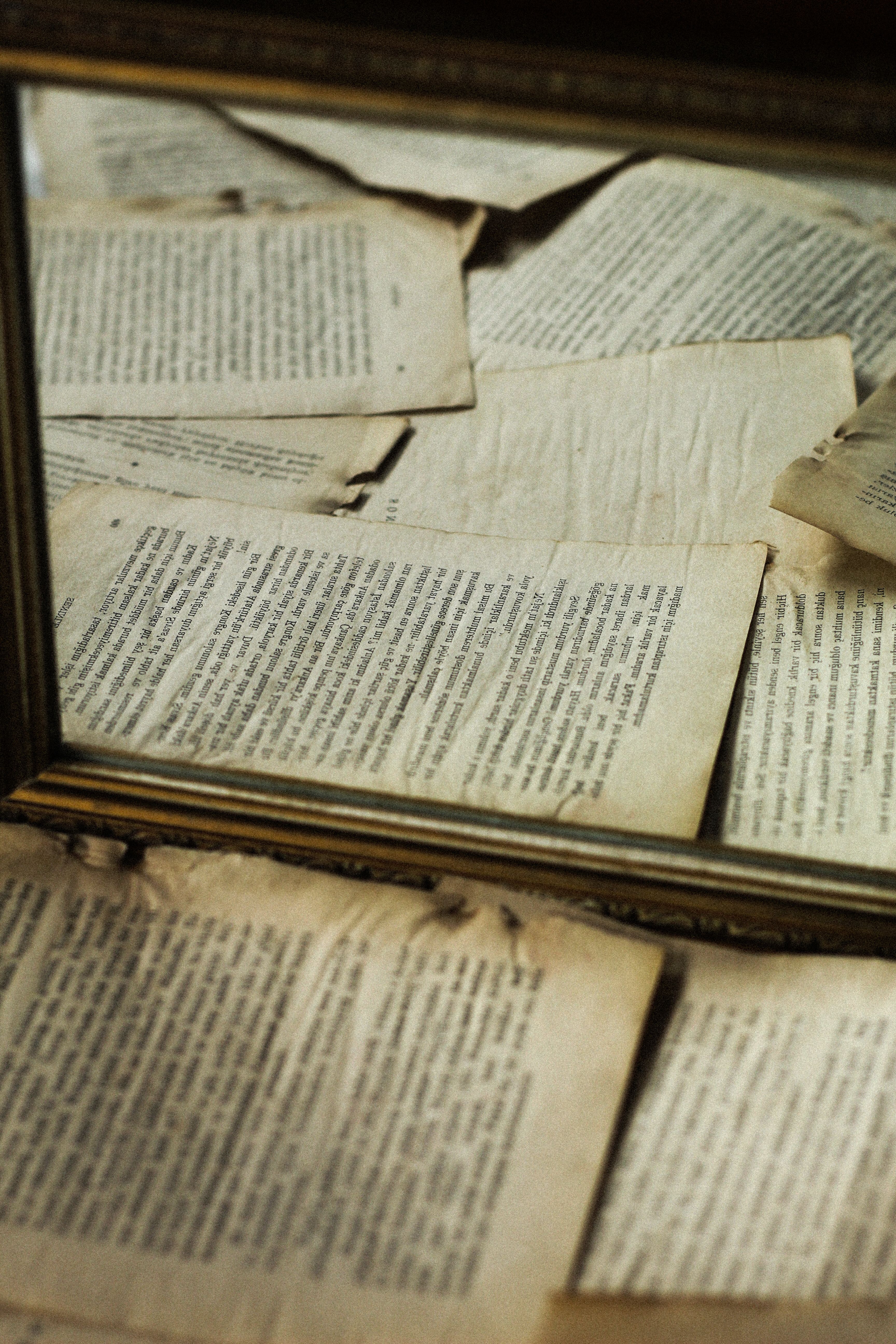 Old Book Pages Reflected in a Mirror · Free Stock Photo