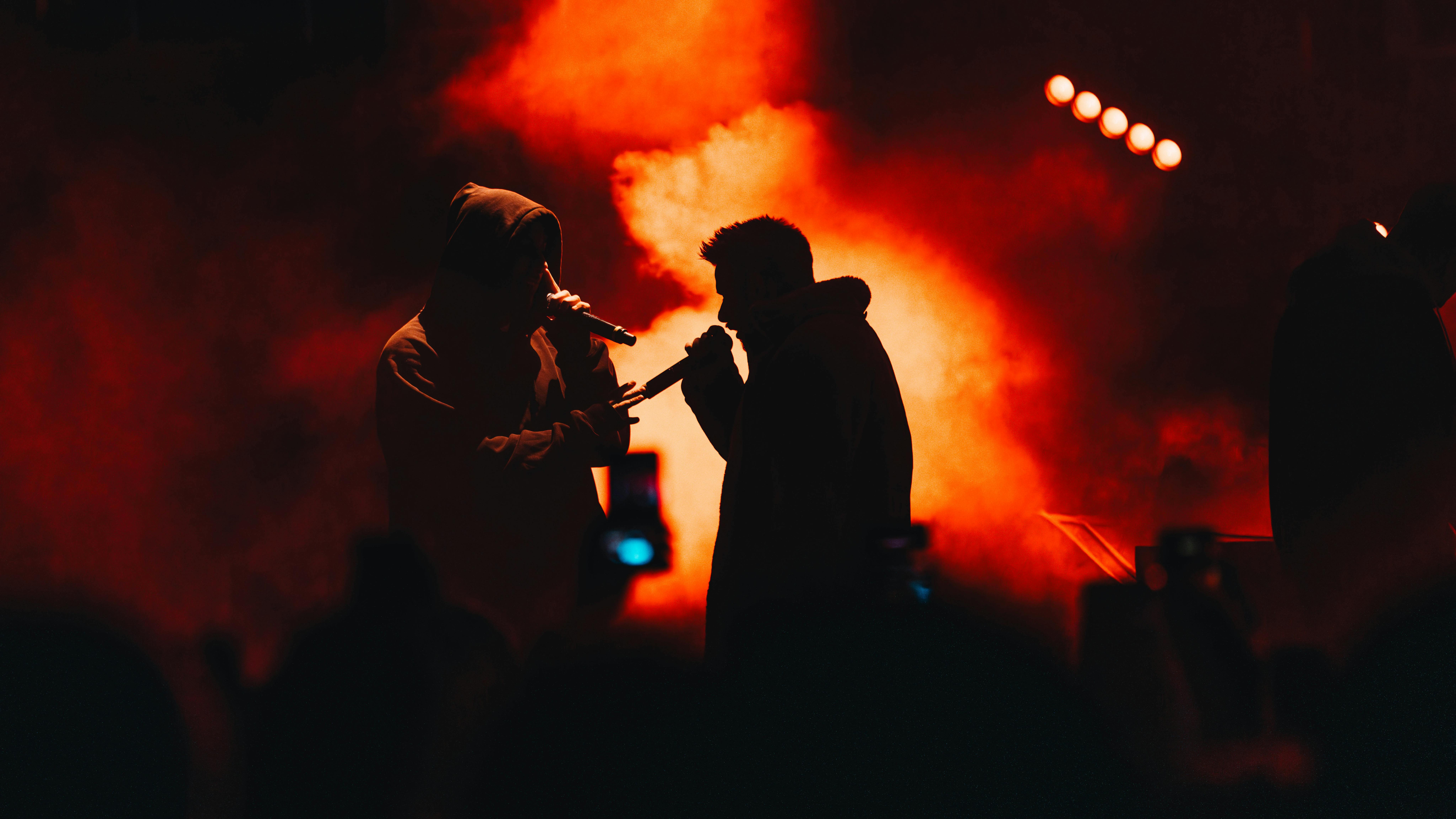 Silhouette of Rappers at Concert · Free Stock Photo