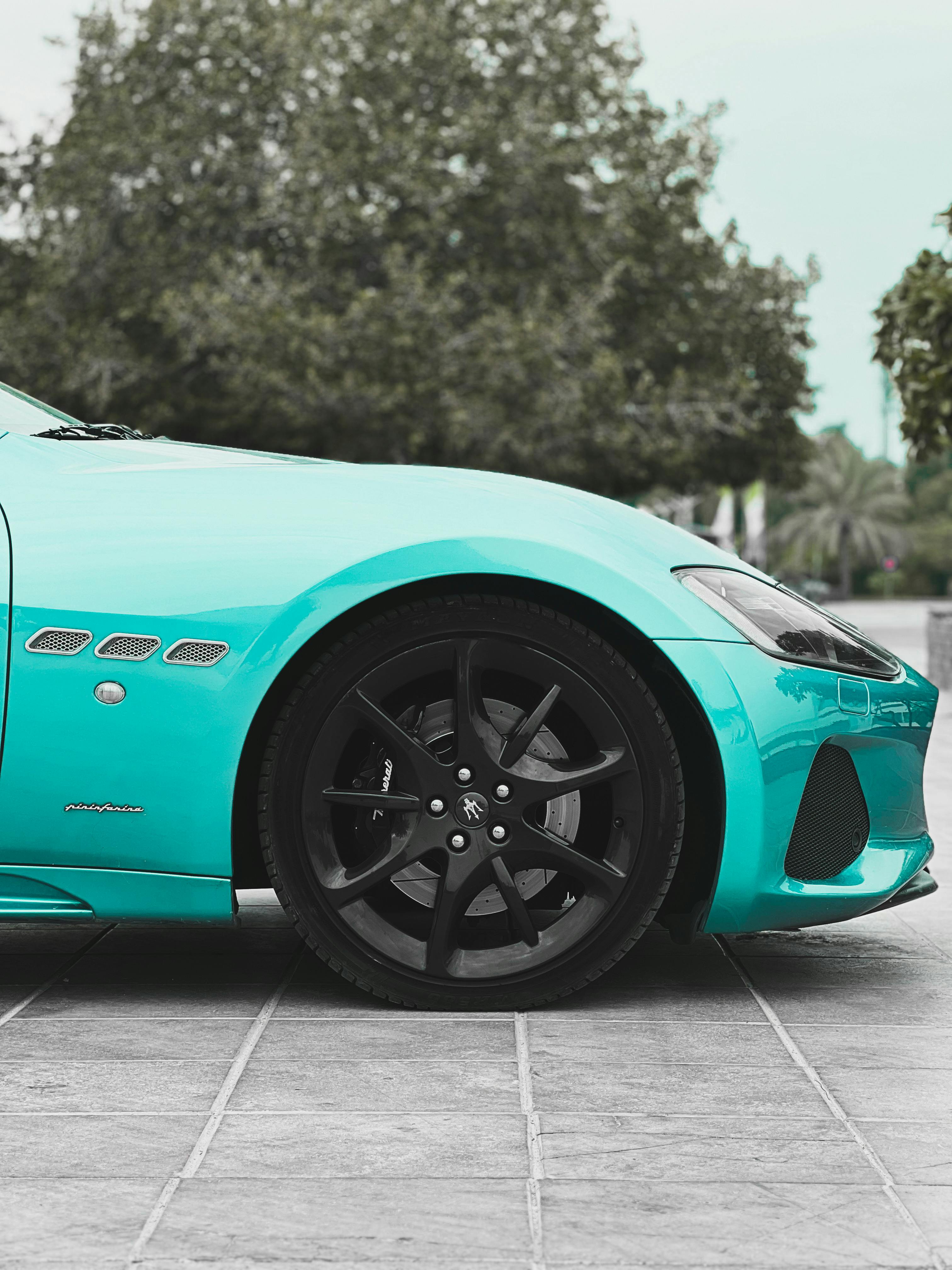 Turquoise Maserati GranTurismo · Free Stock Photo