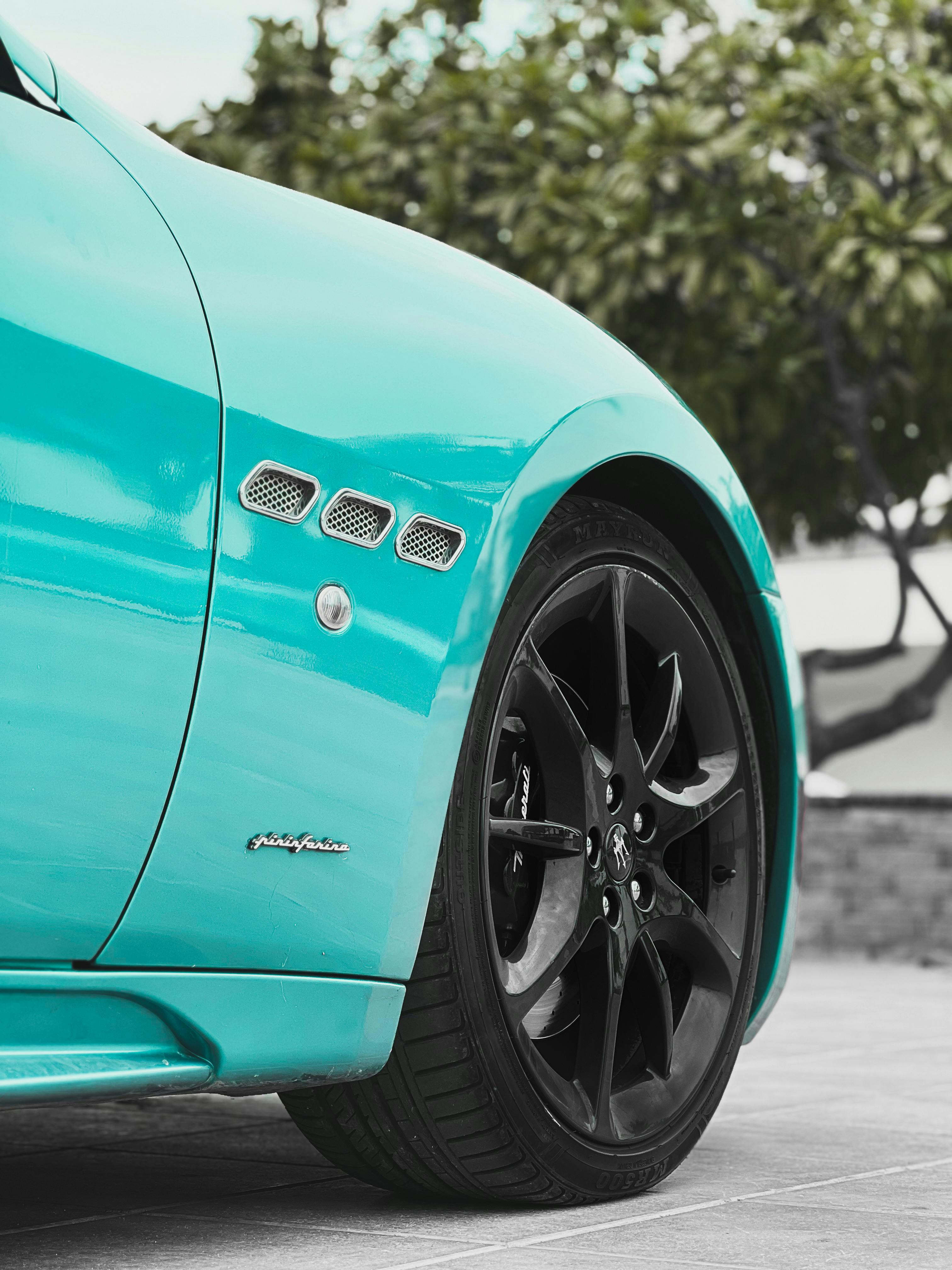 Turquoise Maserati GranTurismo · Free Stock Photo