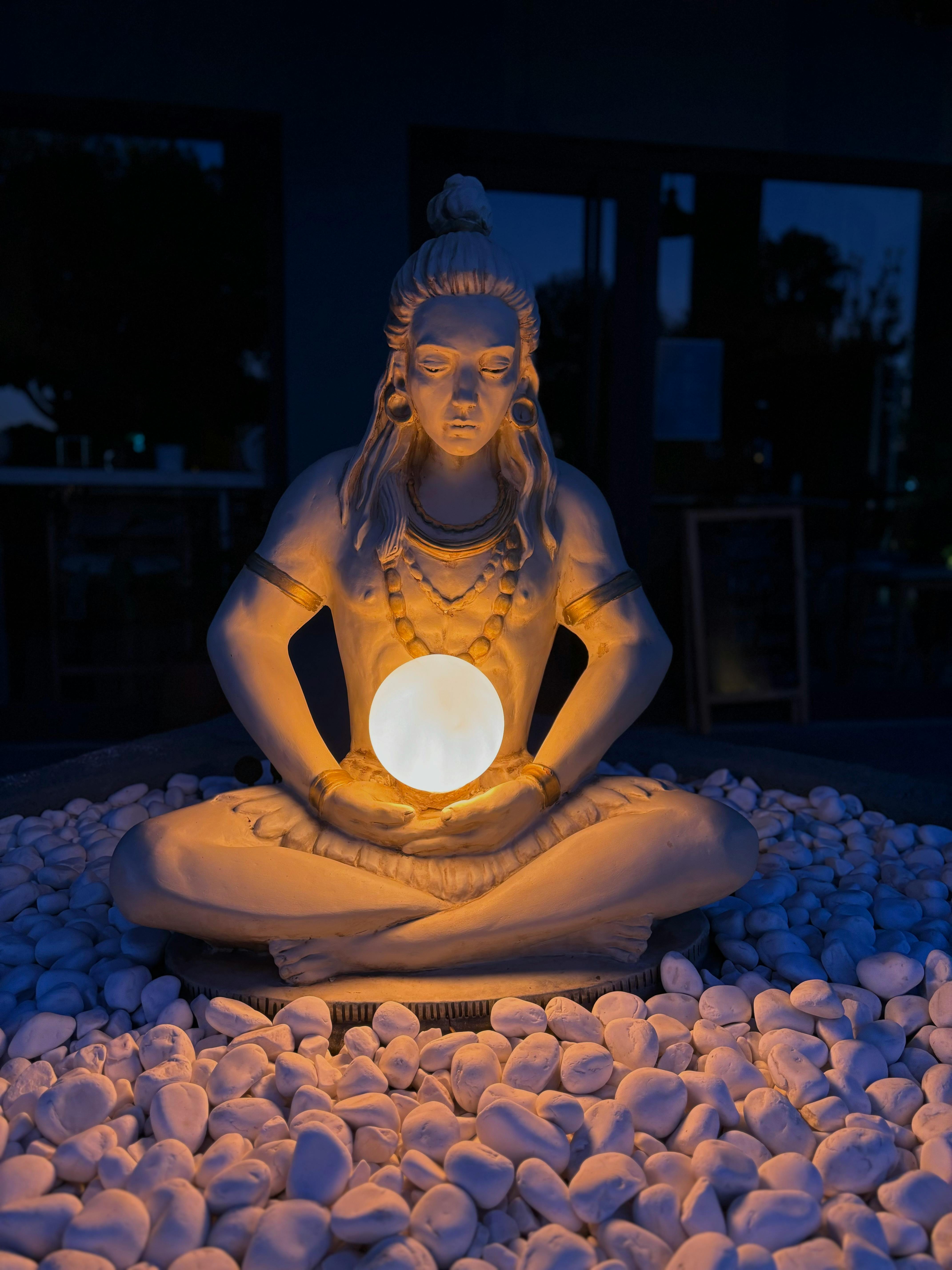 Statue of Shiva Holding a Light · Free Stock Photo