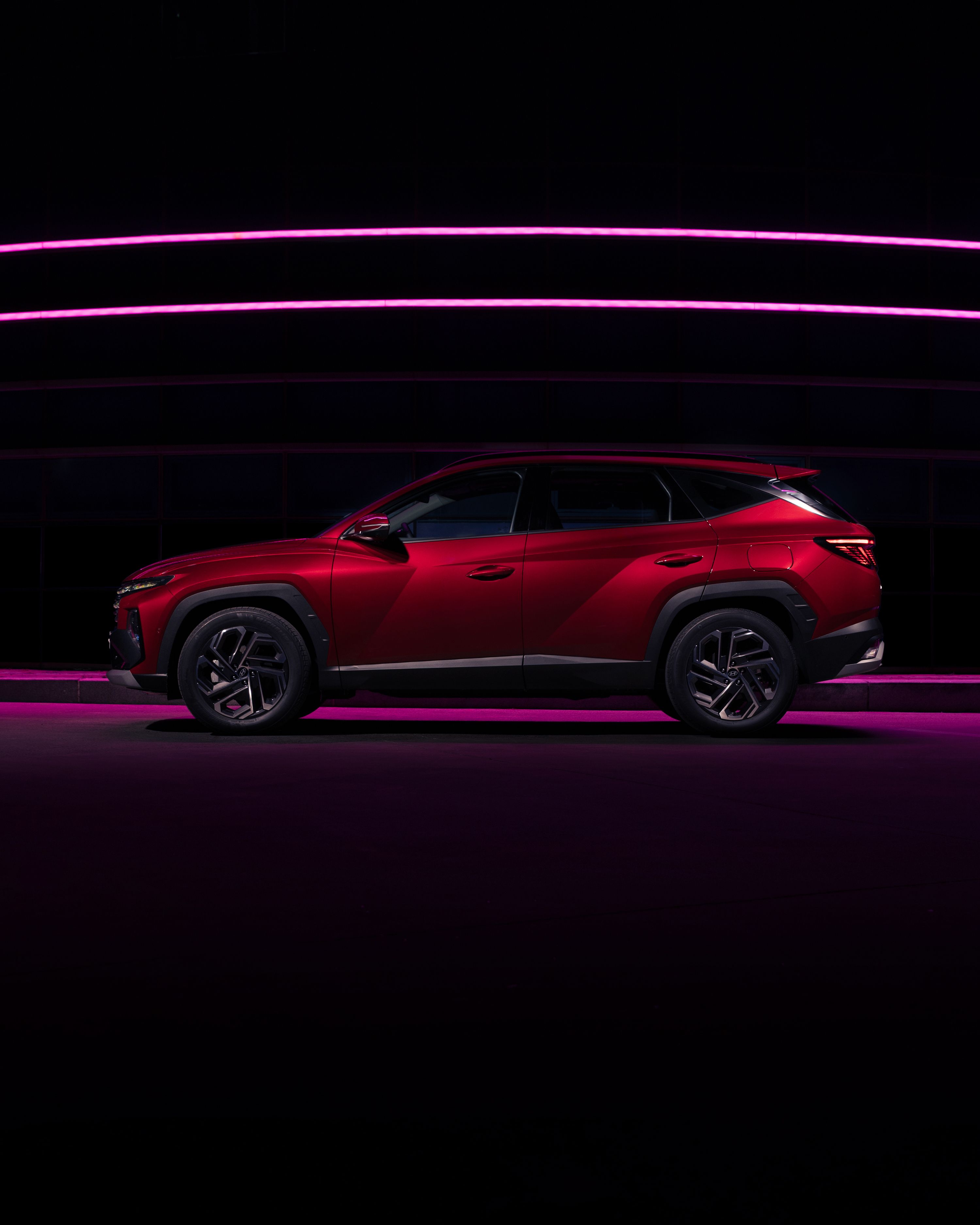 Red Car in Front of Neon Lights · Free Stock Photo