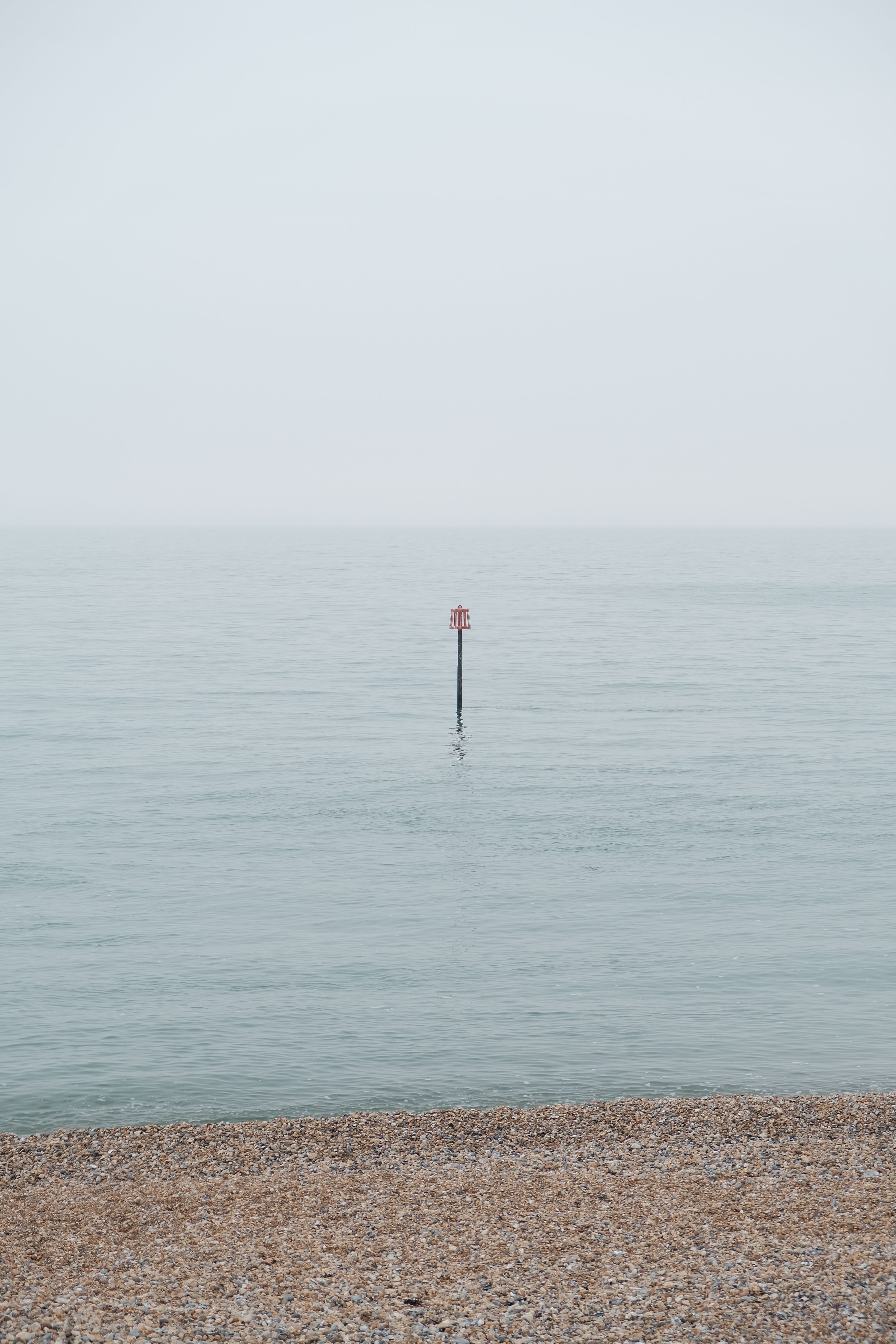 Pole in Water on Sea Shore · Free Stock Photo
