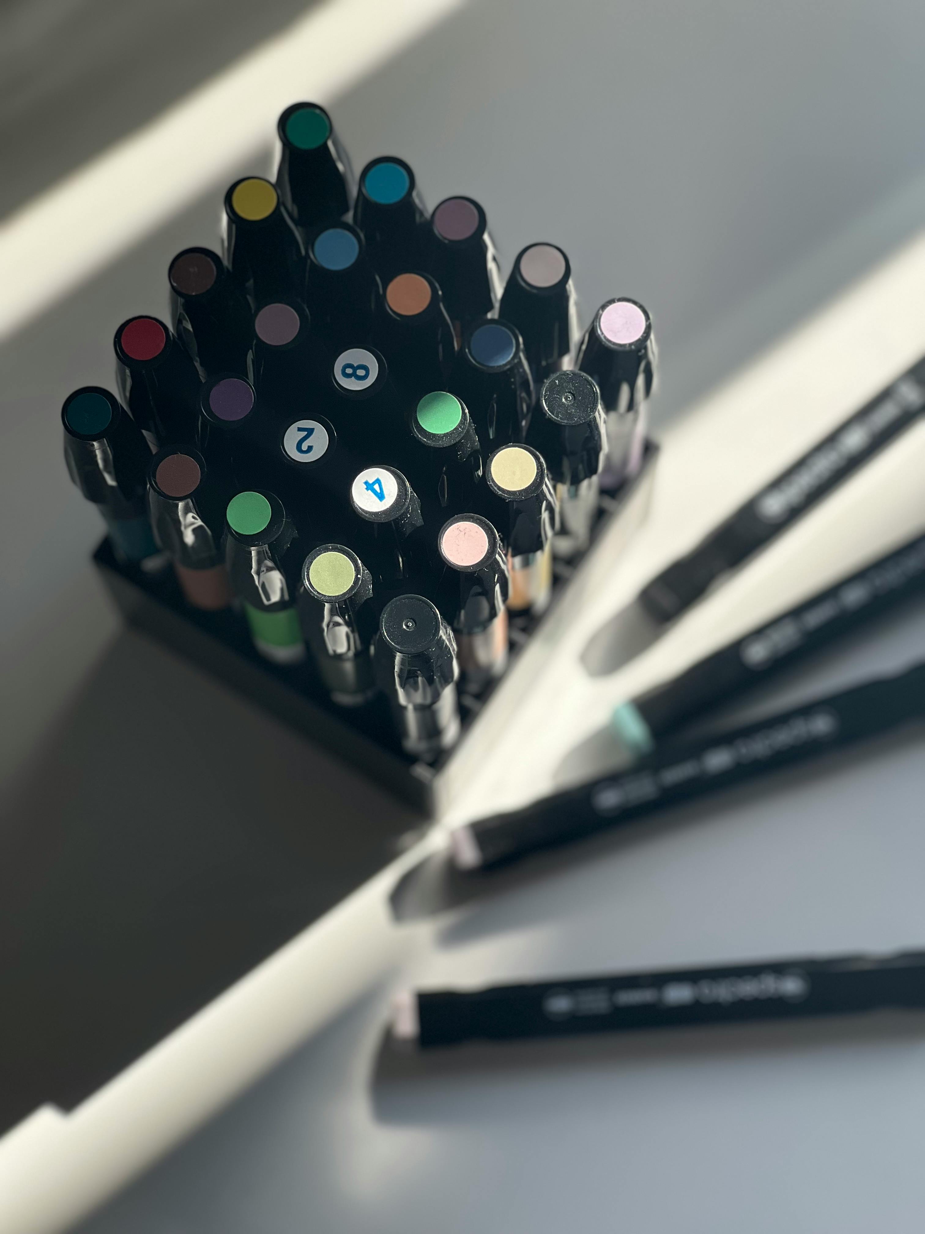 Set of Markers on Table · Free Stock Photo