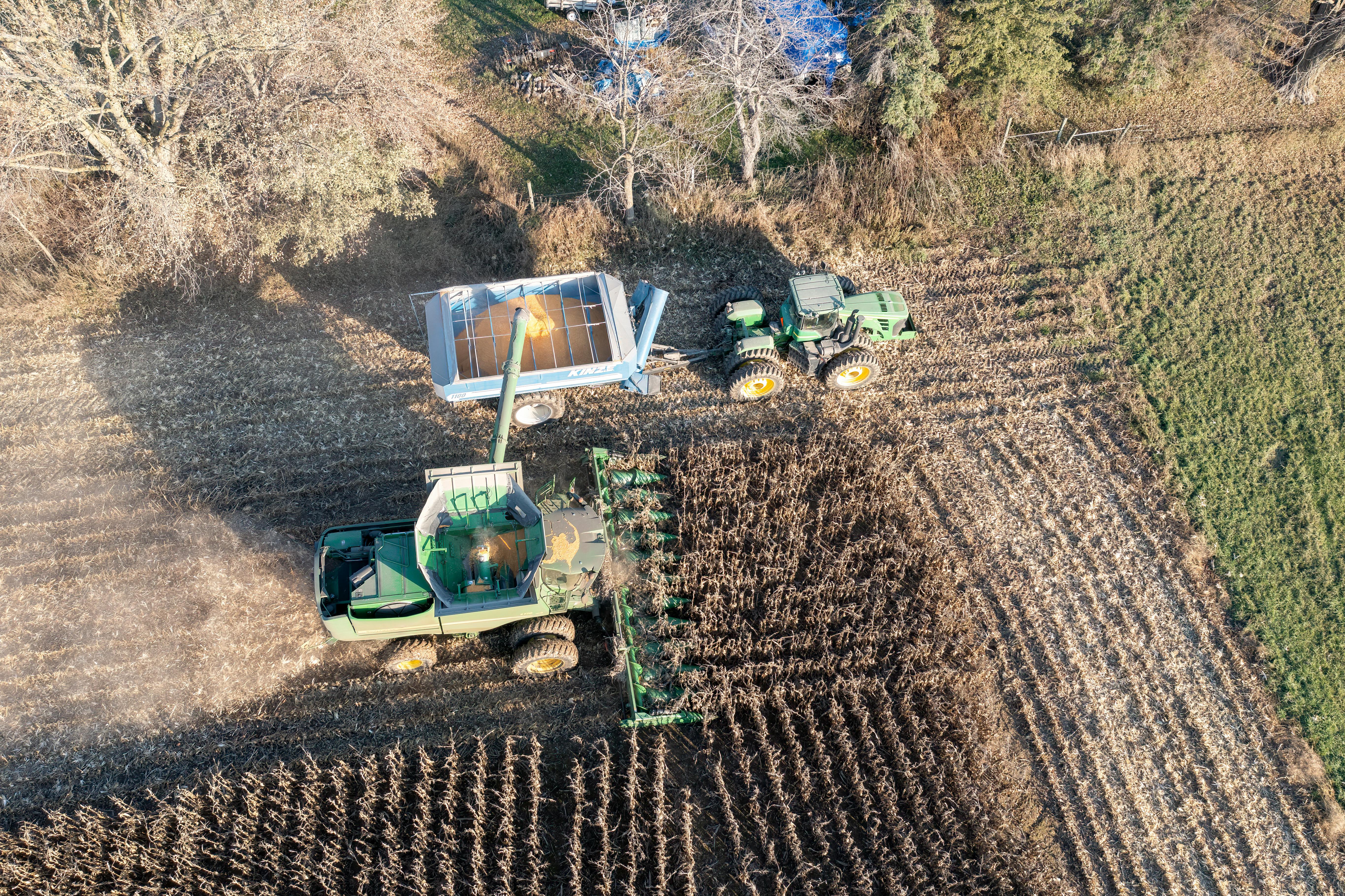 Aerial Shot of Green Milling Tractor · Free Stock Photo