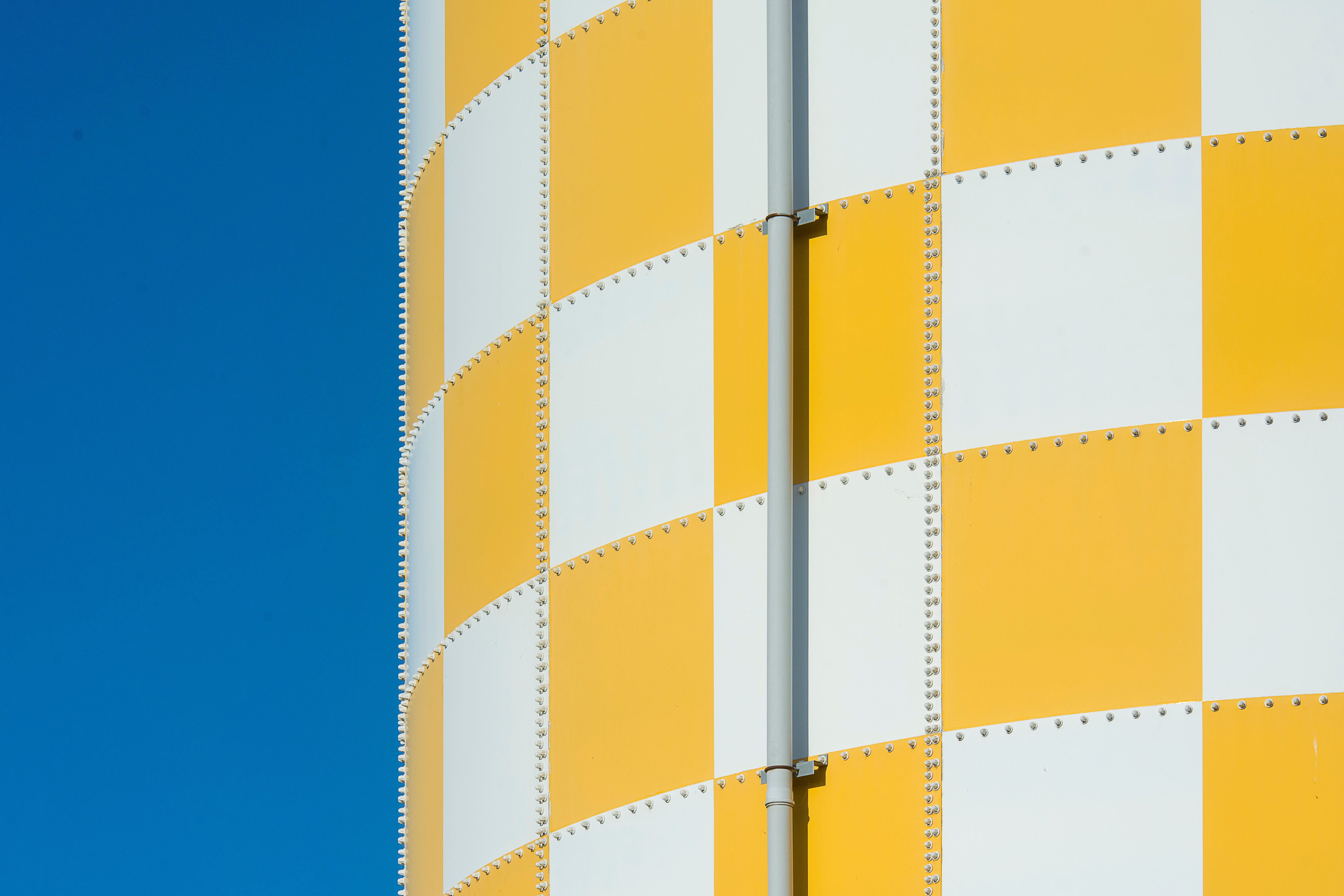 White and Yellow Squares on Building Wall · Free Stock Photo