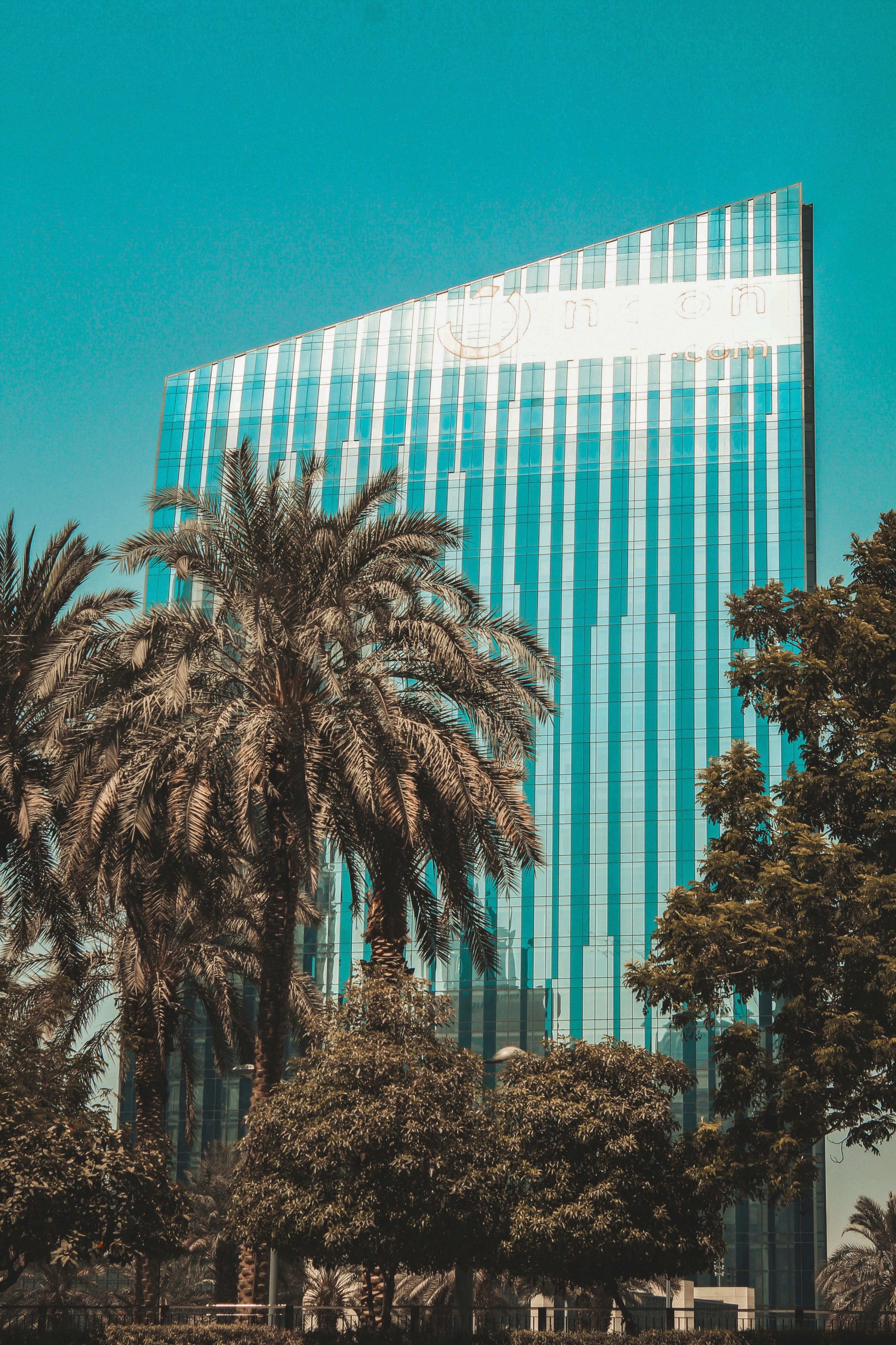 Glass Skyscrapers with Slanted Rooftop · Free Stock Photo