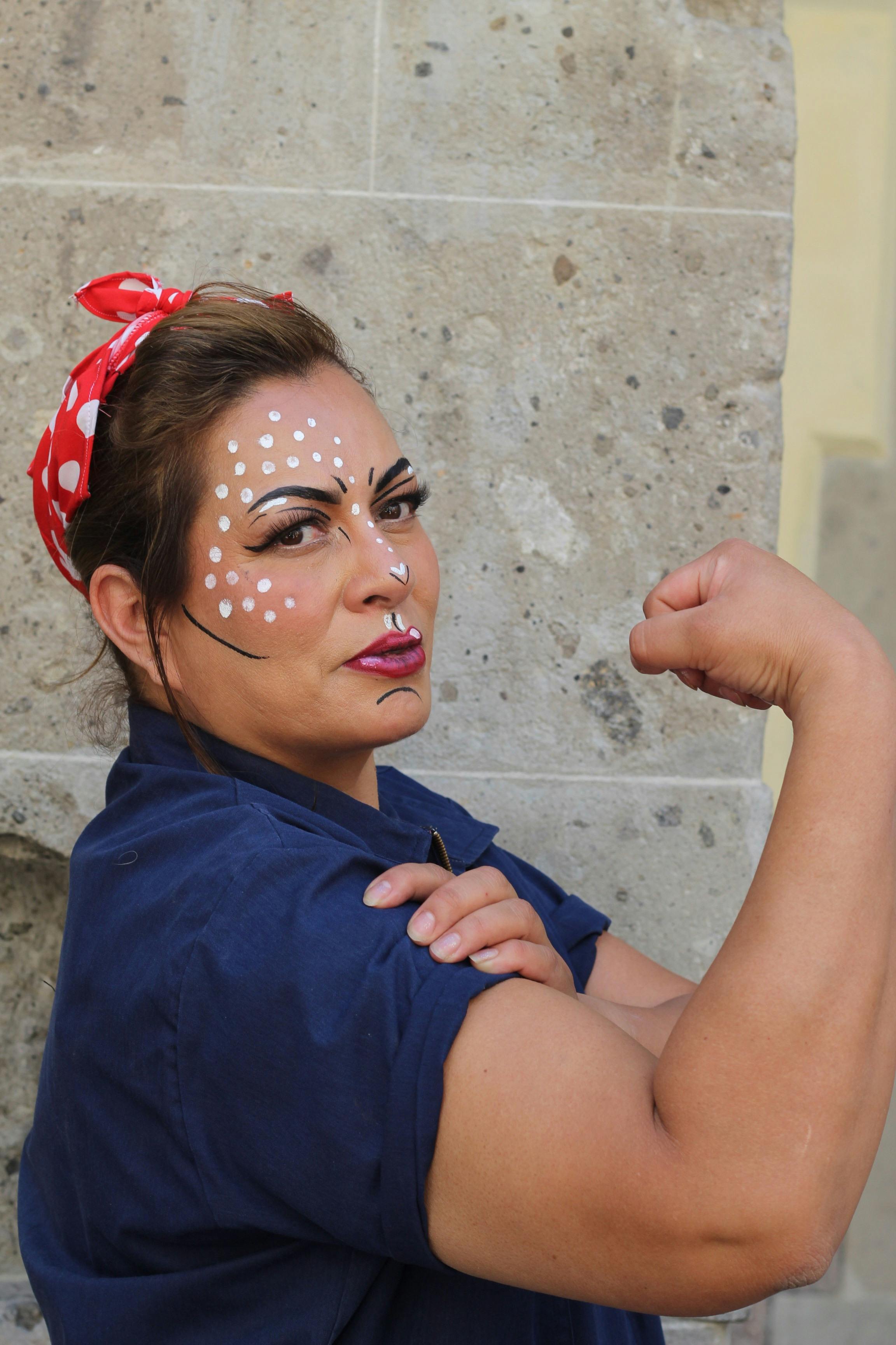 Woman in Costume Makeup Showing Muscle · Free Stock Photo