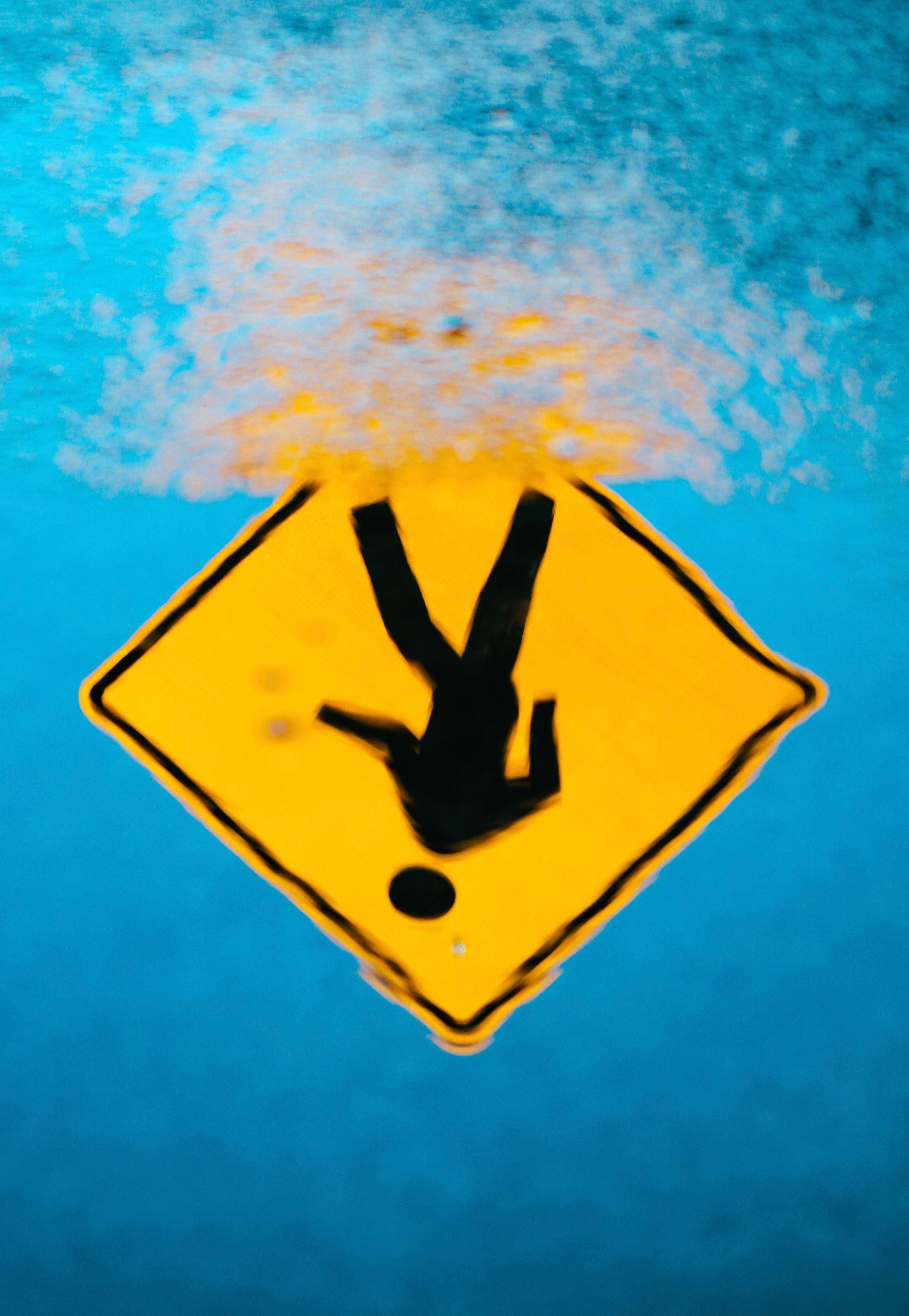 Road Sign with Pedestrian Sunken in Water · Free Stock Photo