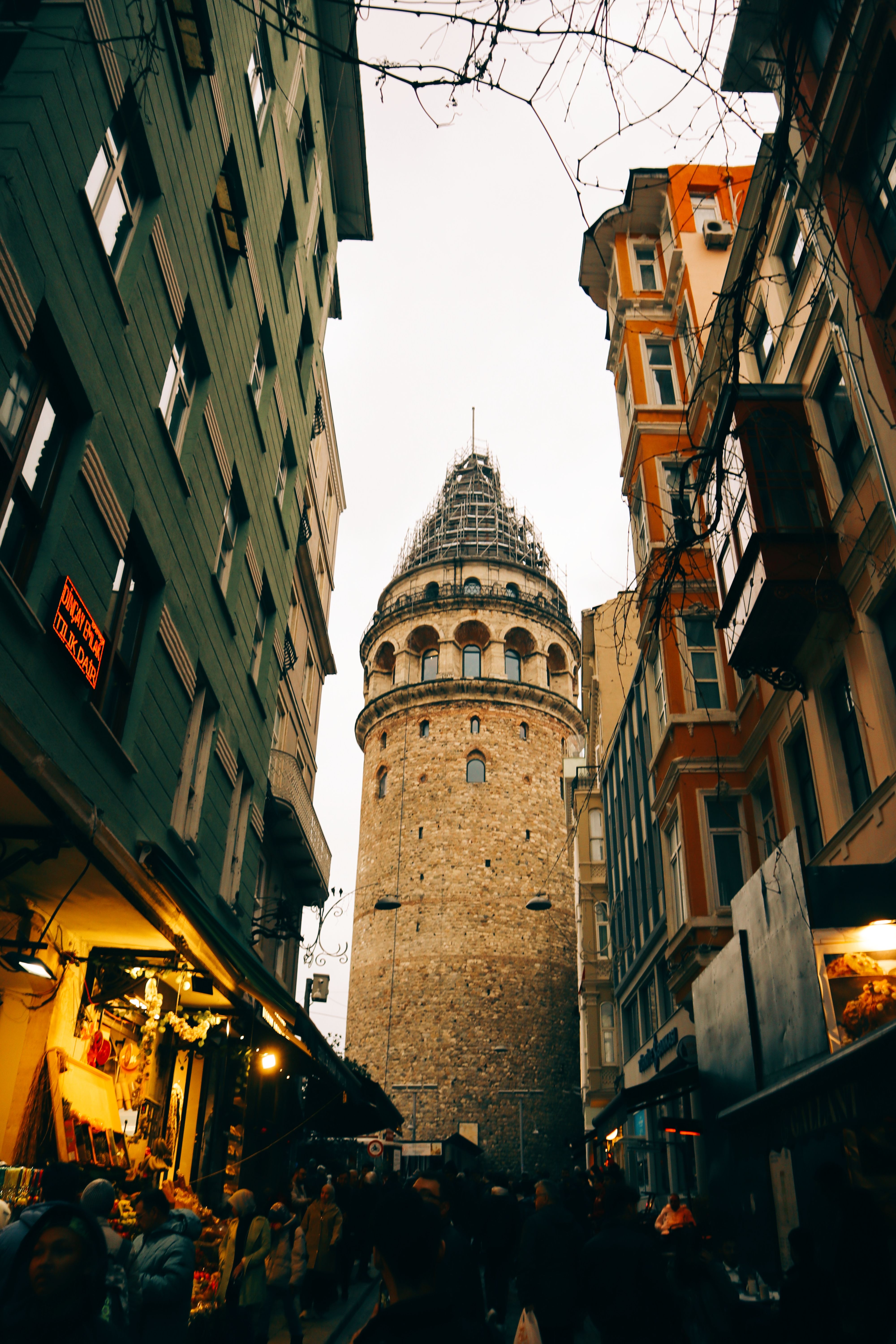A tall tower in the middle of a city street · Free Stock Photo