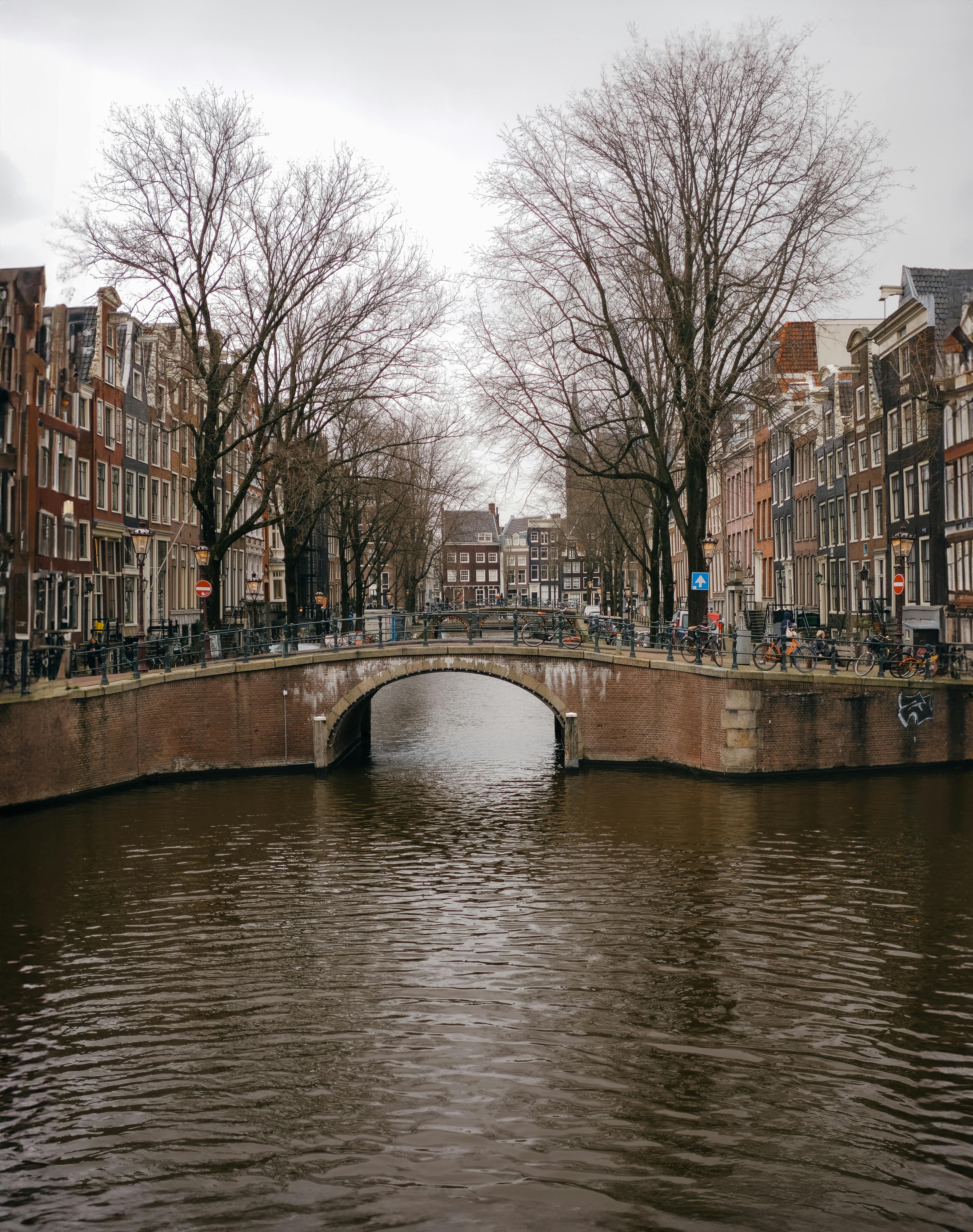 Canal and Footbridge in Amsterdam · Free Stock Photo